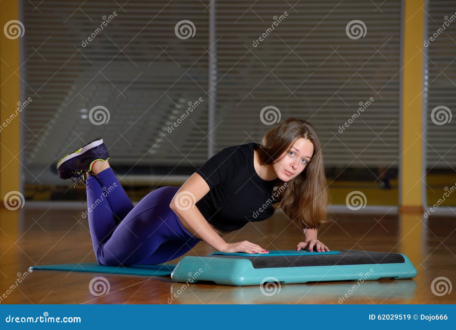 Sporty Girl Doing Push-ups on Platform for an Aerobics Step Stock Image ...