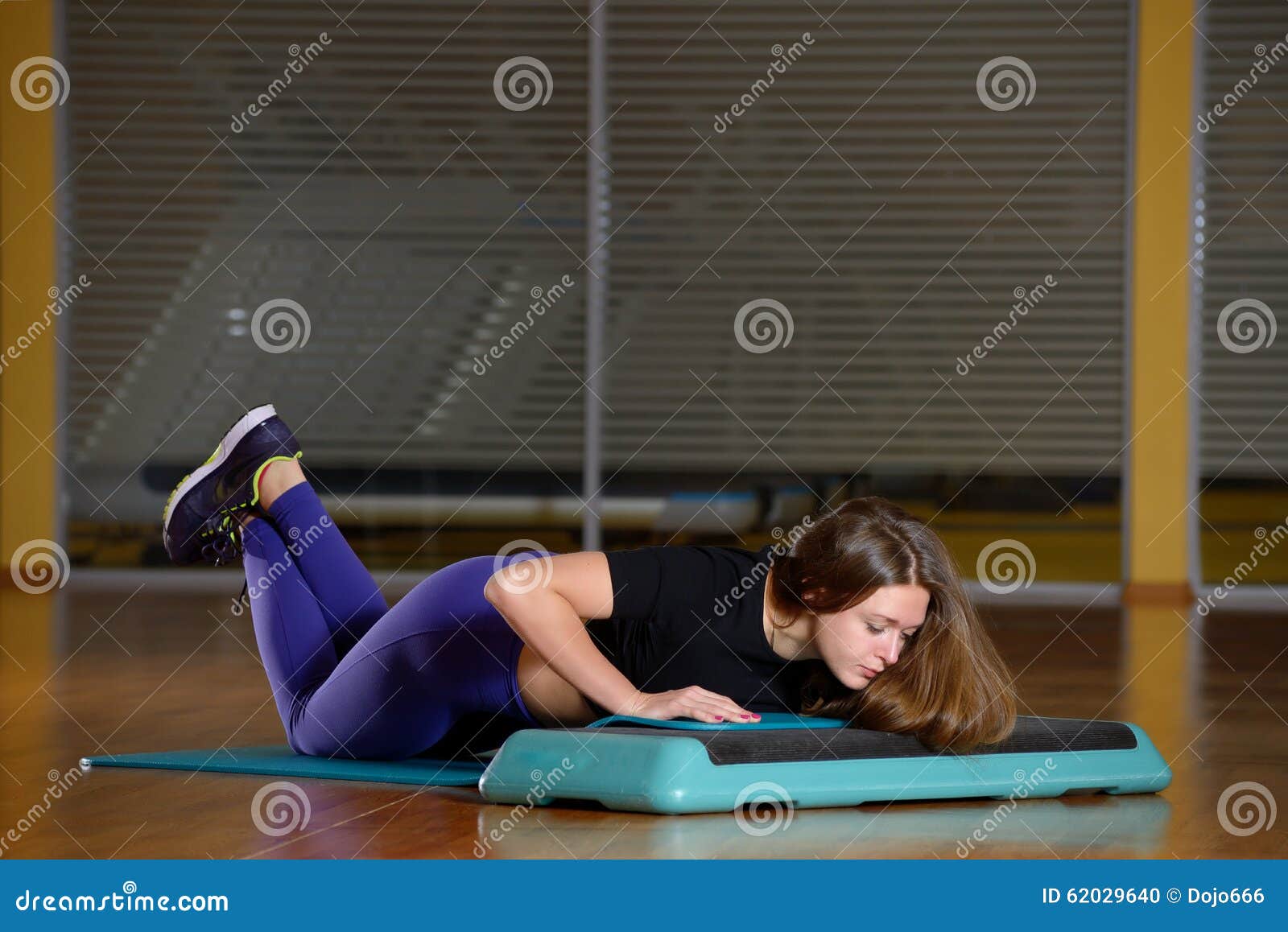 Sporty Girl Doing Push-ups on Platform for an Aerobics Step Stock Photo ...