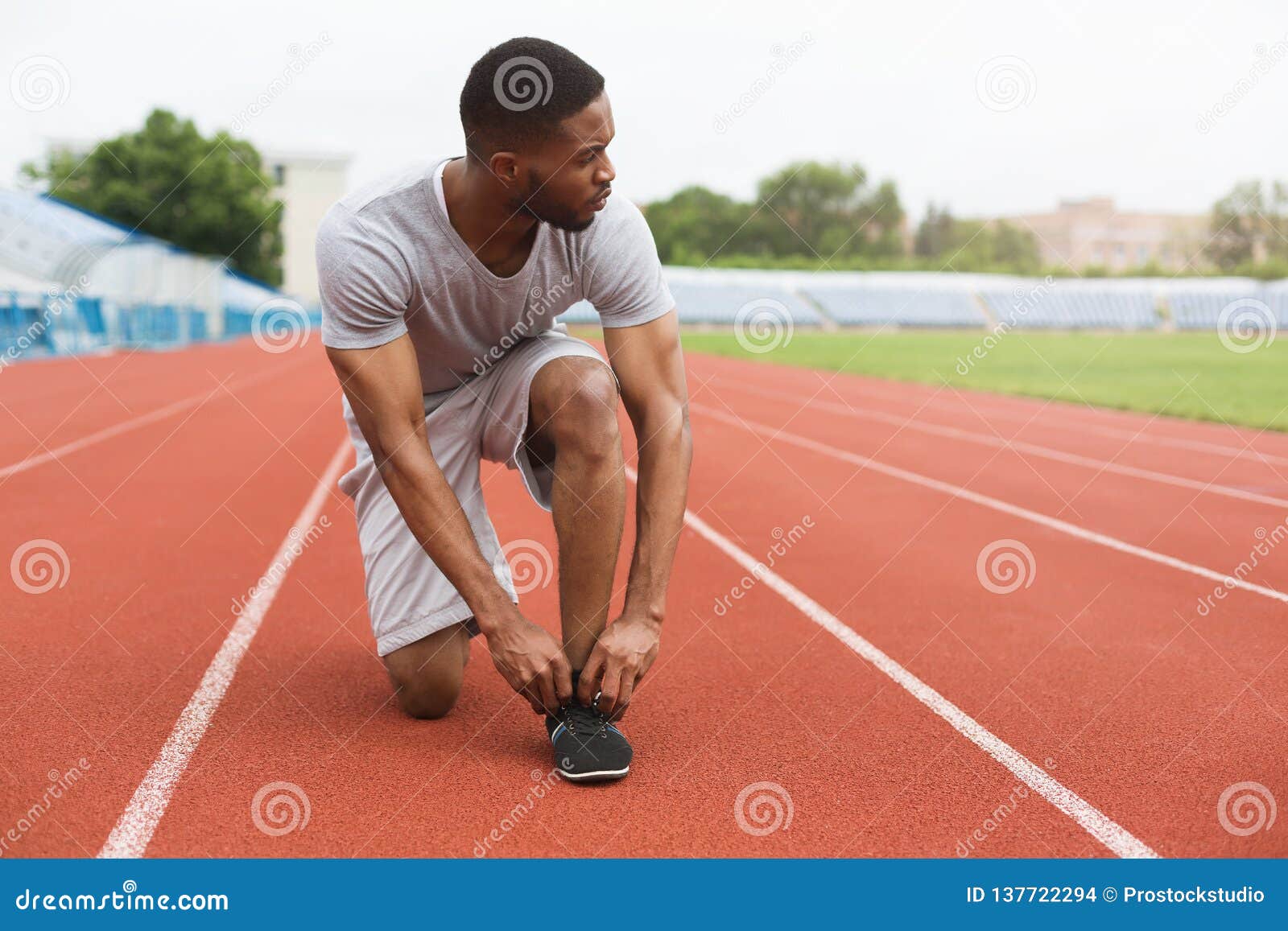Sporty Man Preparing for Run Stock Photo - Image of outside ...