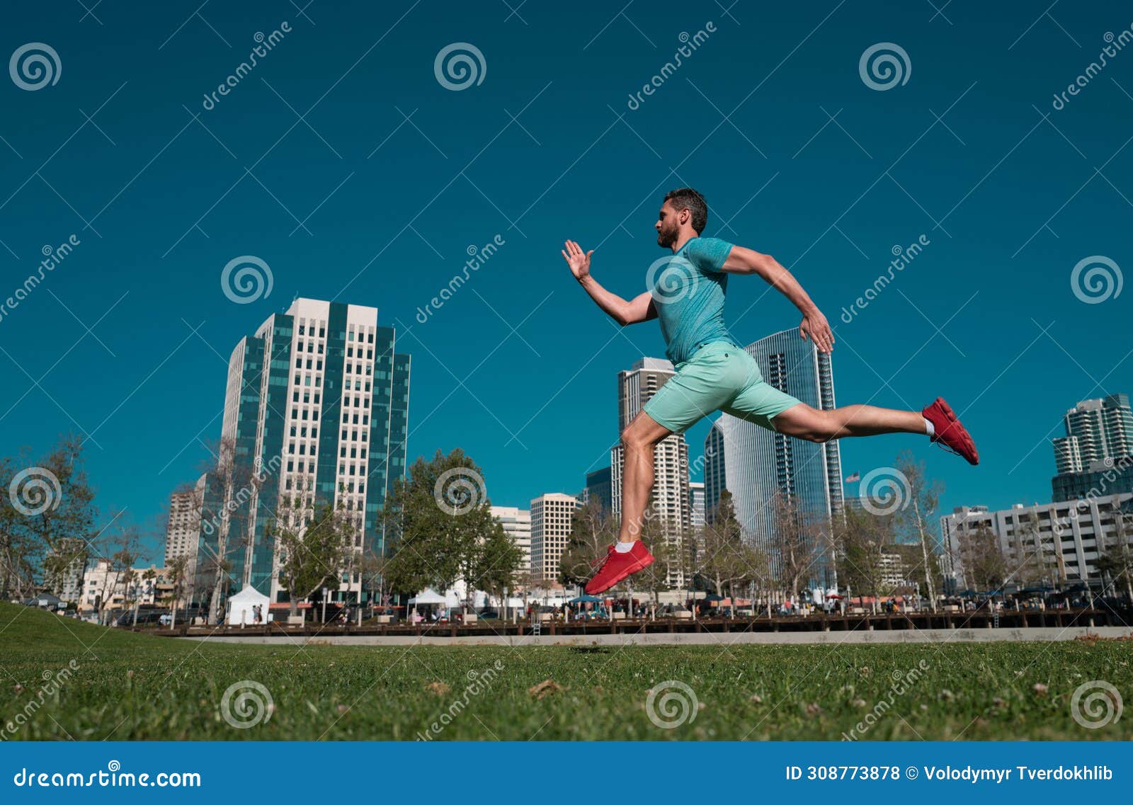 Sporty Man Runner Running in Summer. Dynamic Jumping Movement. Stock ...