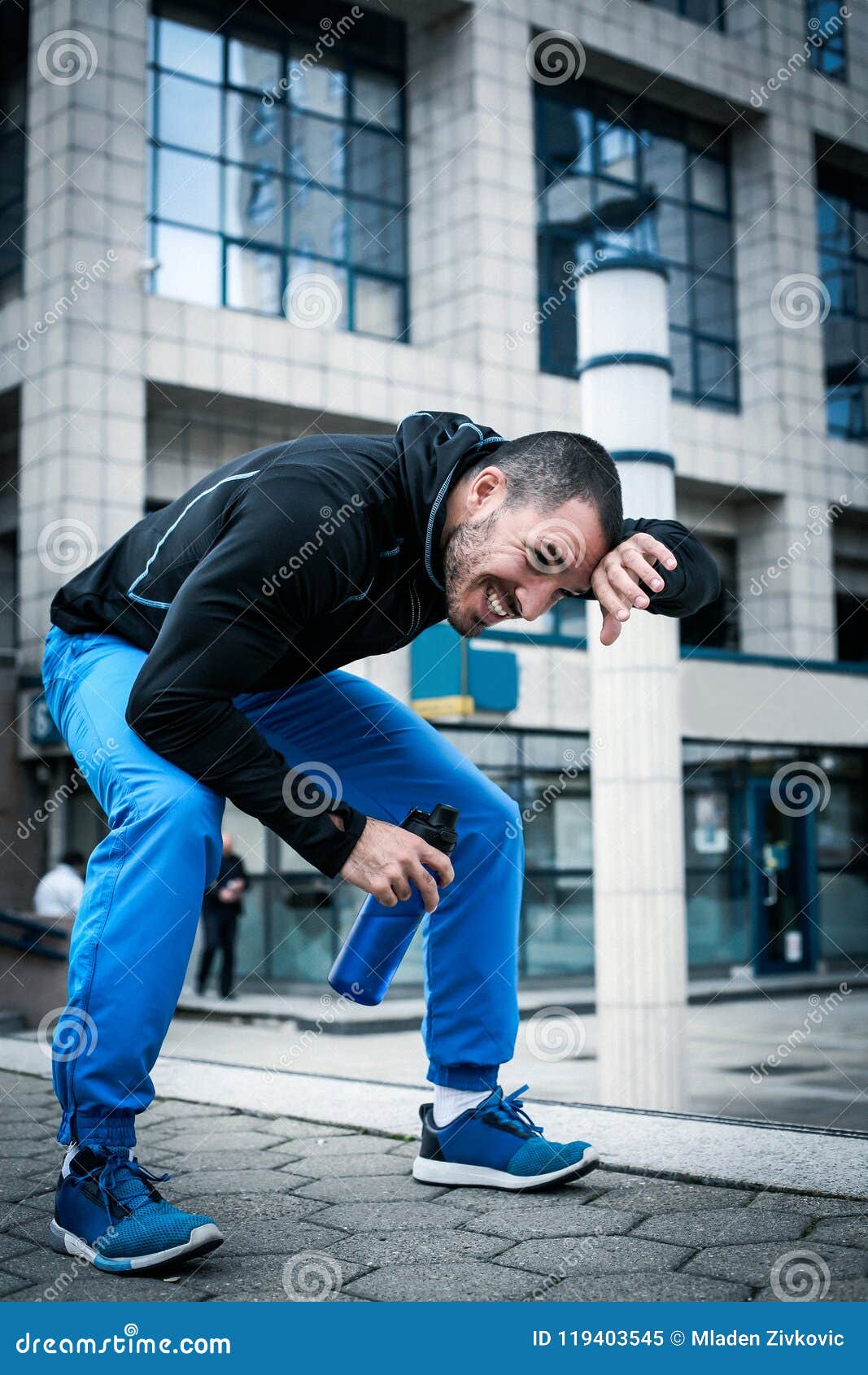 Sporty Man Taking Break after Exercise. Stock Image - Image of ...