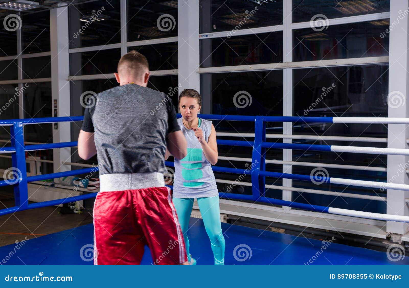 Sporty Pair in Action Practicing Boxing in Regular Boxing Ring Stock ...