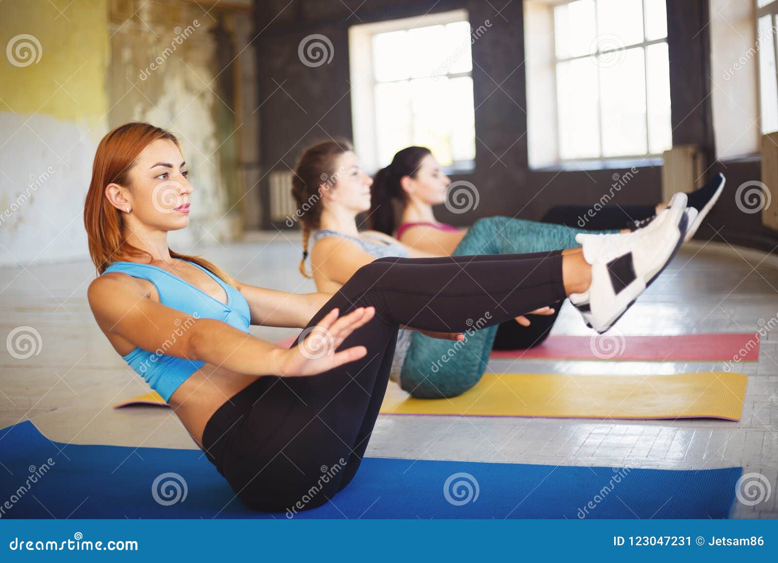 Sporty Women Doing Abdominal Crunches At Workout Stock Image Image Of