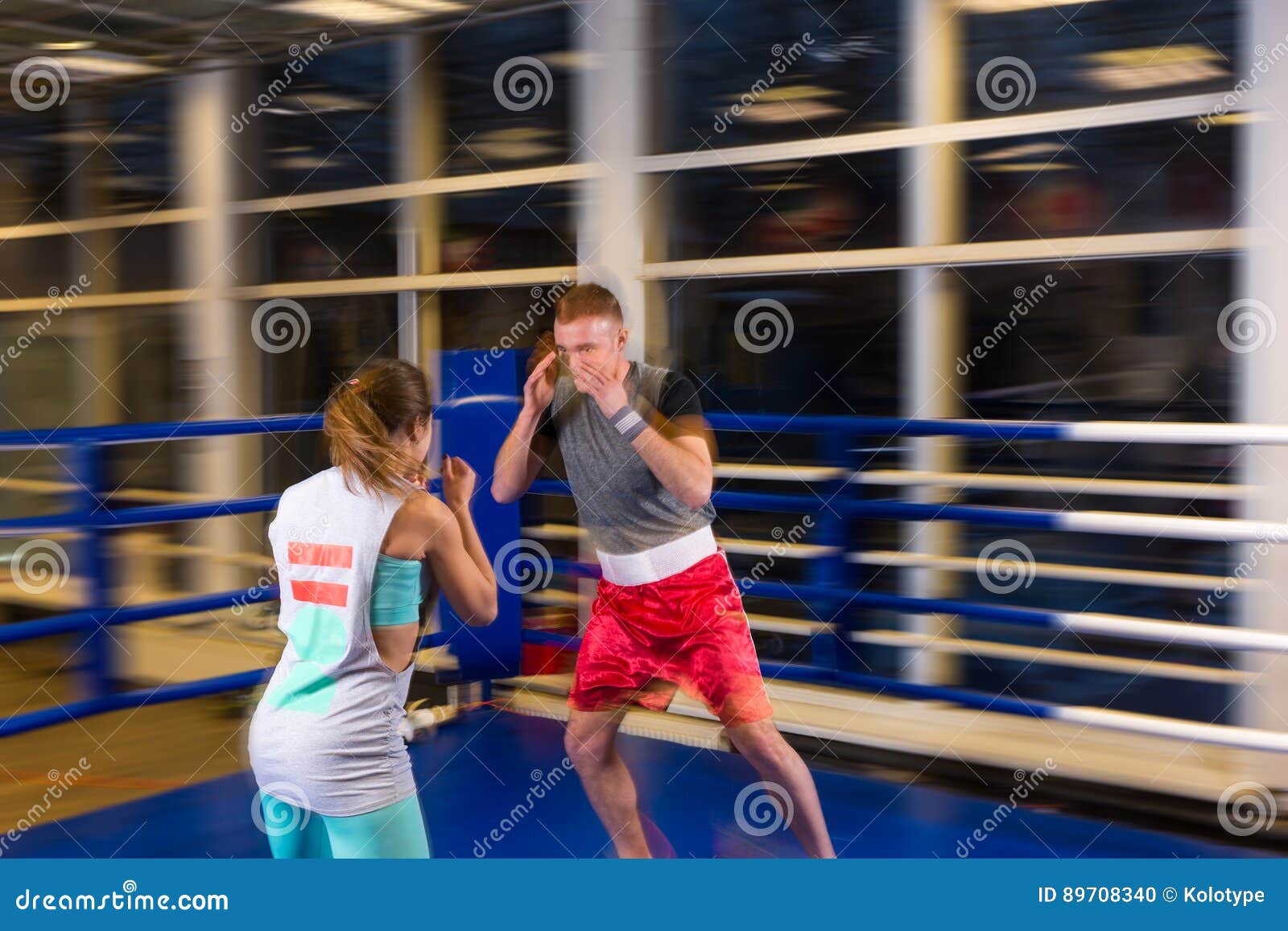 Sporty Young Couple in Action Practicing Boxing Stock Photo - Image of ...