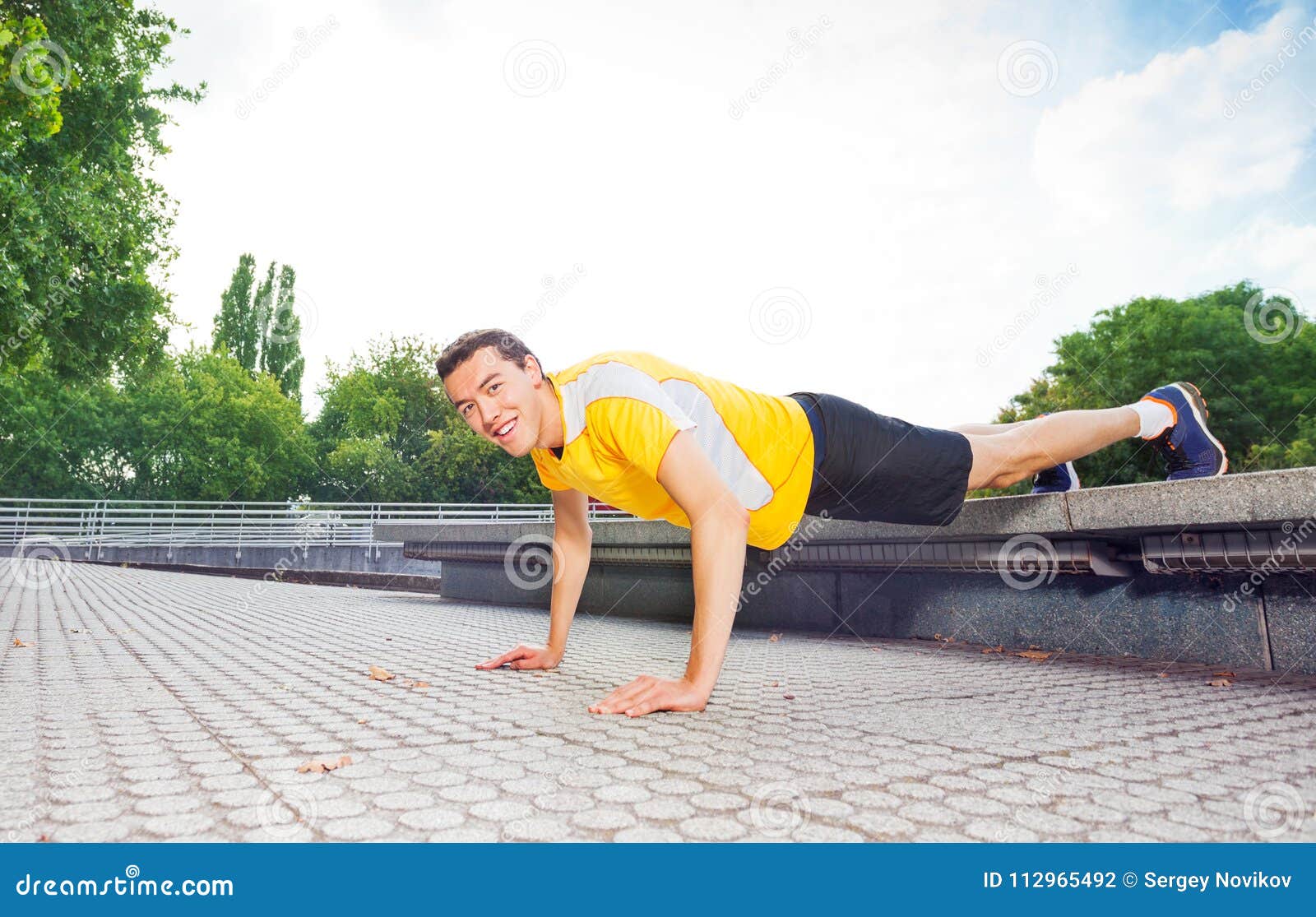 Sporty Young Man Doing Plank Exercise Outdoors Stock Photo - Image of ...