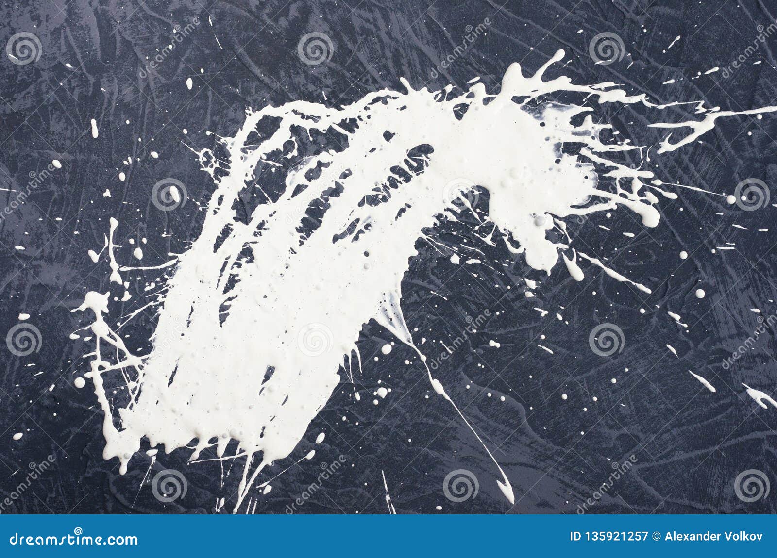 A Spot of White Spilled Paint on a Concrete Textured Surface Stock ...