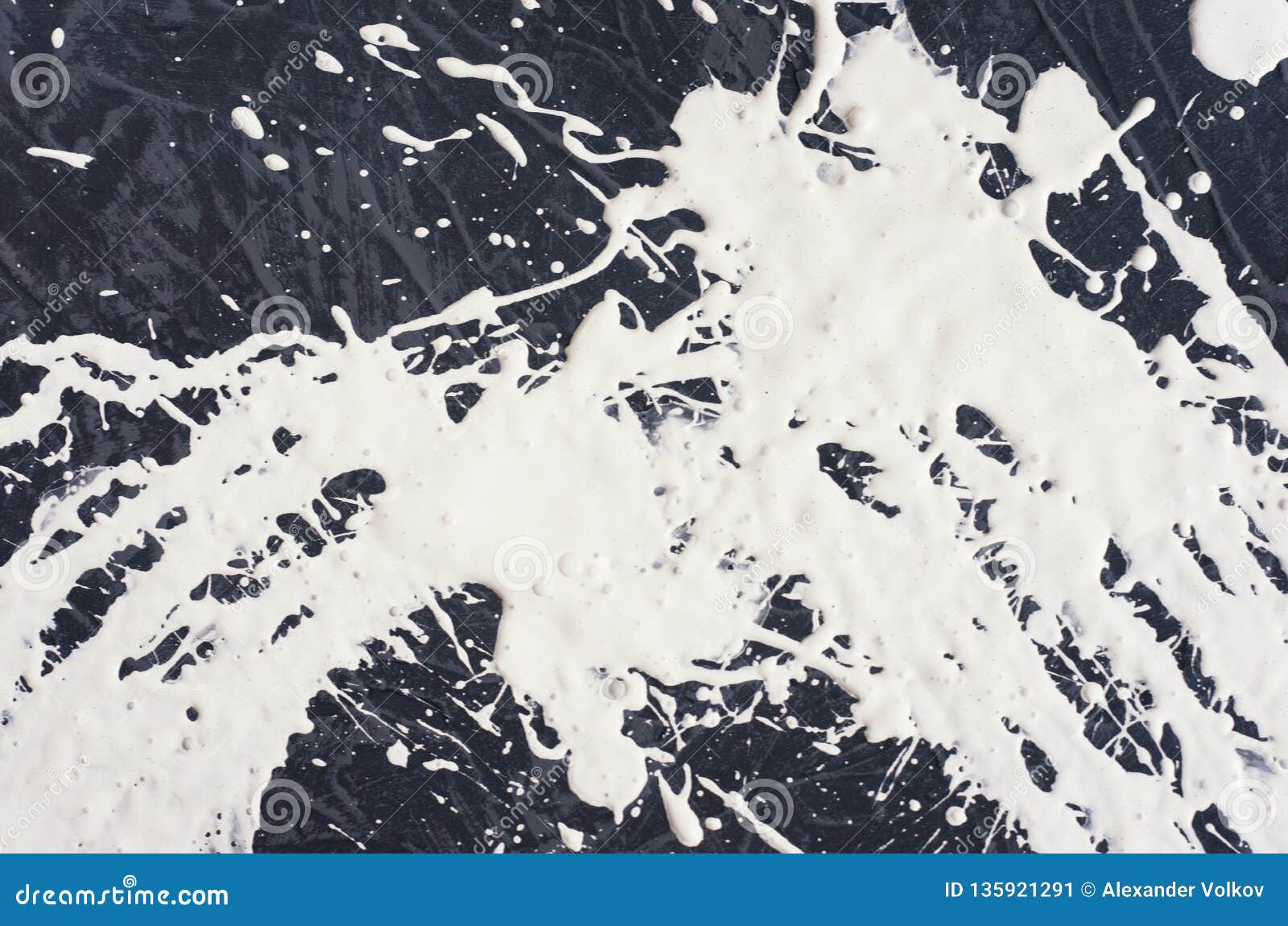 A Spot of White Spilled Paint on a Concrete Textured Surface Stock ...