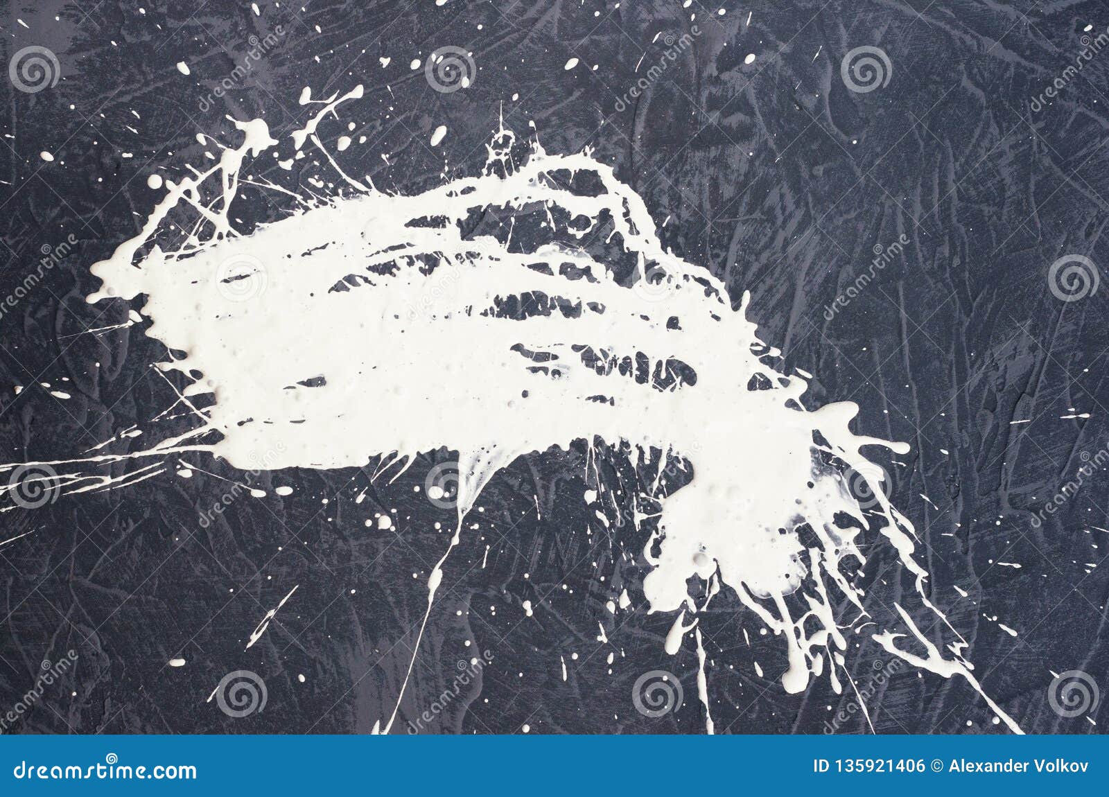A Spot of White Spilled Paint on a Concrete Textured Surface Stock ...