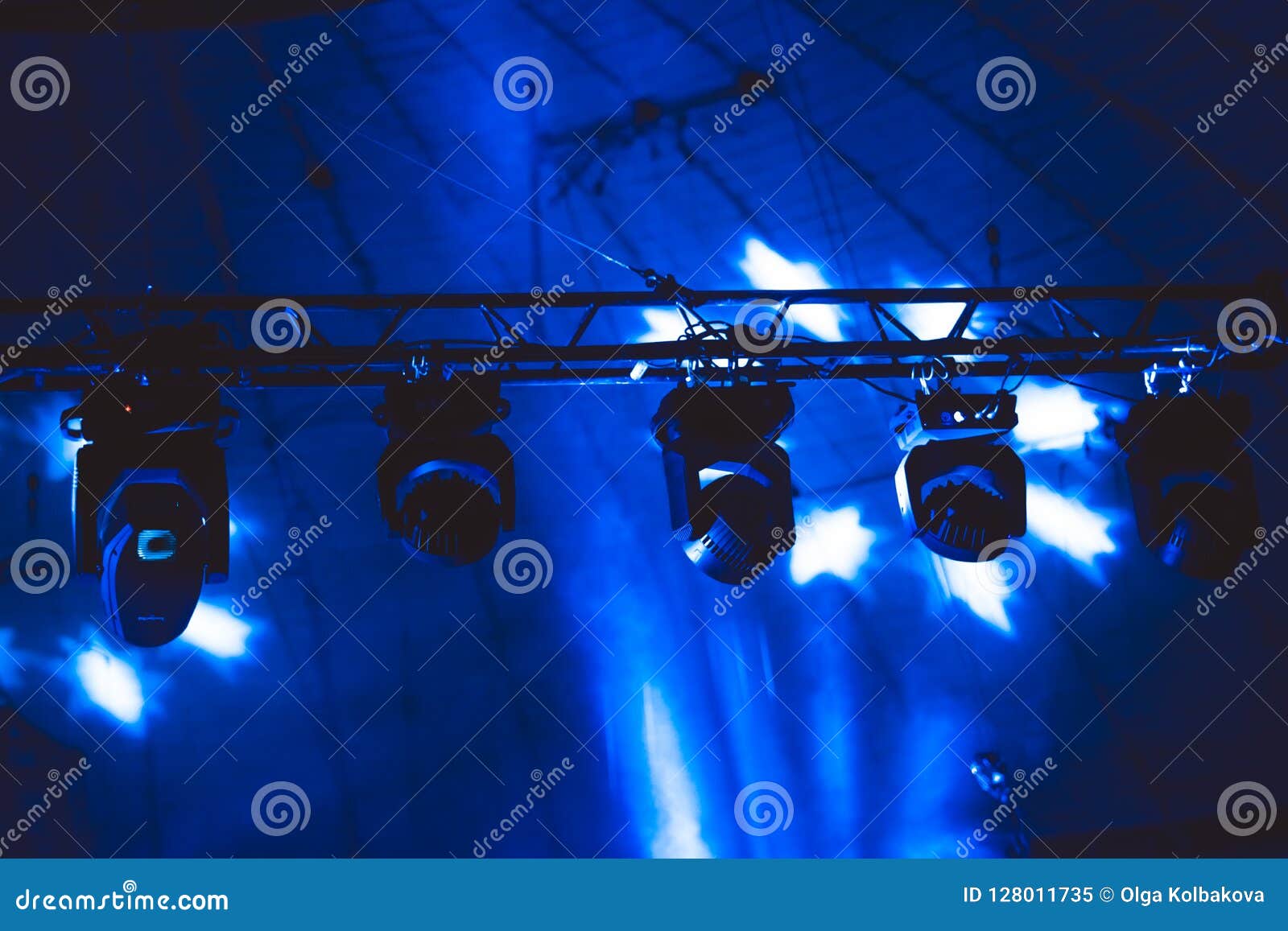 Spotlight at the concert stock image. Image of glow - 128011735