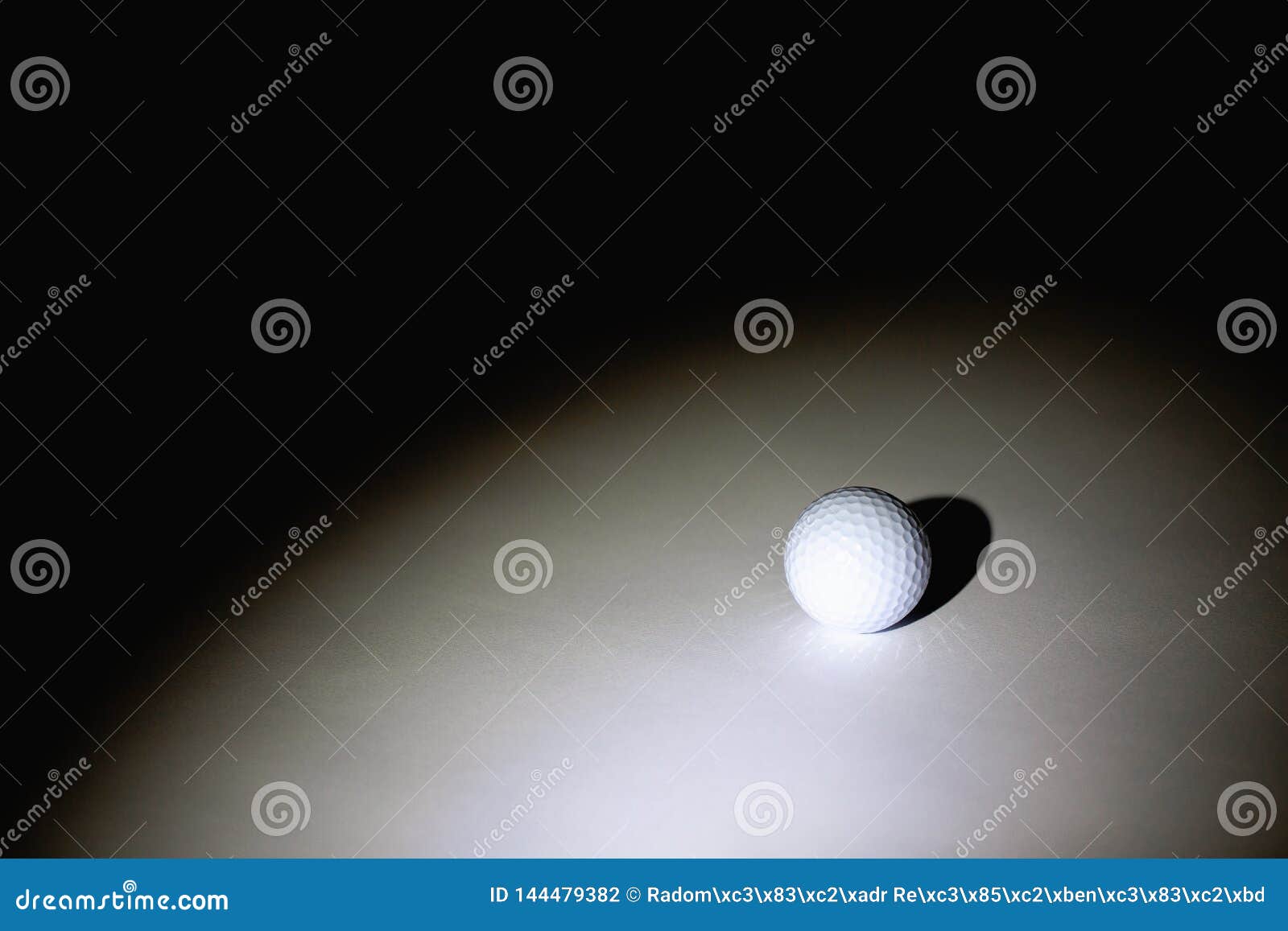 Spotlight and Golf Ball in the Dark Room Stock Photo - Image of game ...