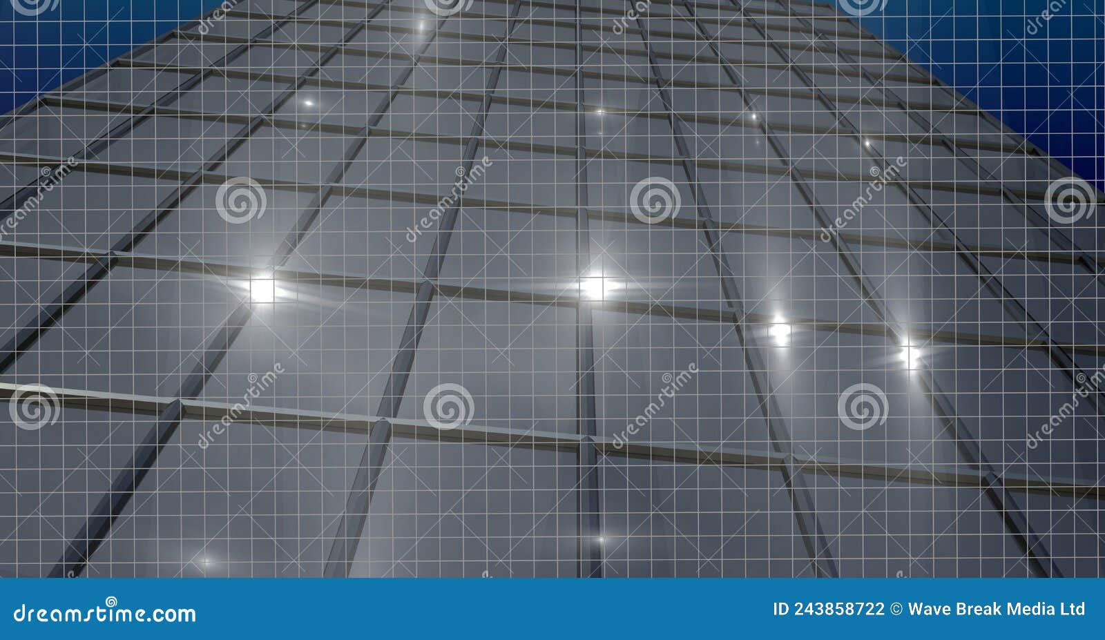Spots of Lights Over Tall Building Model Against Blue Background Stock ...
