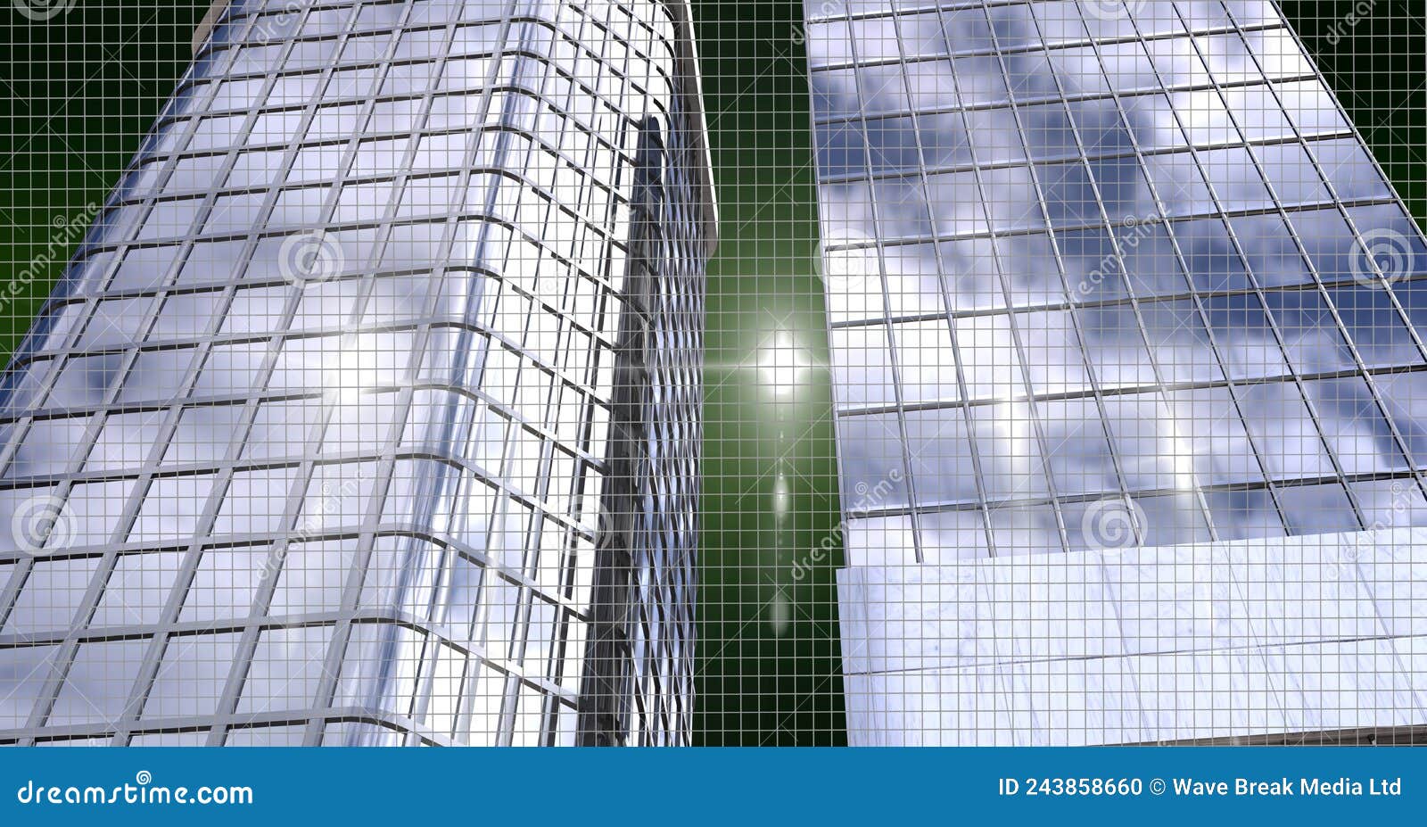 Spots of Lights Over Two Tall Building Models Against Green Background ...