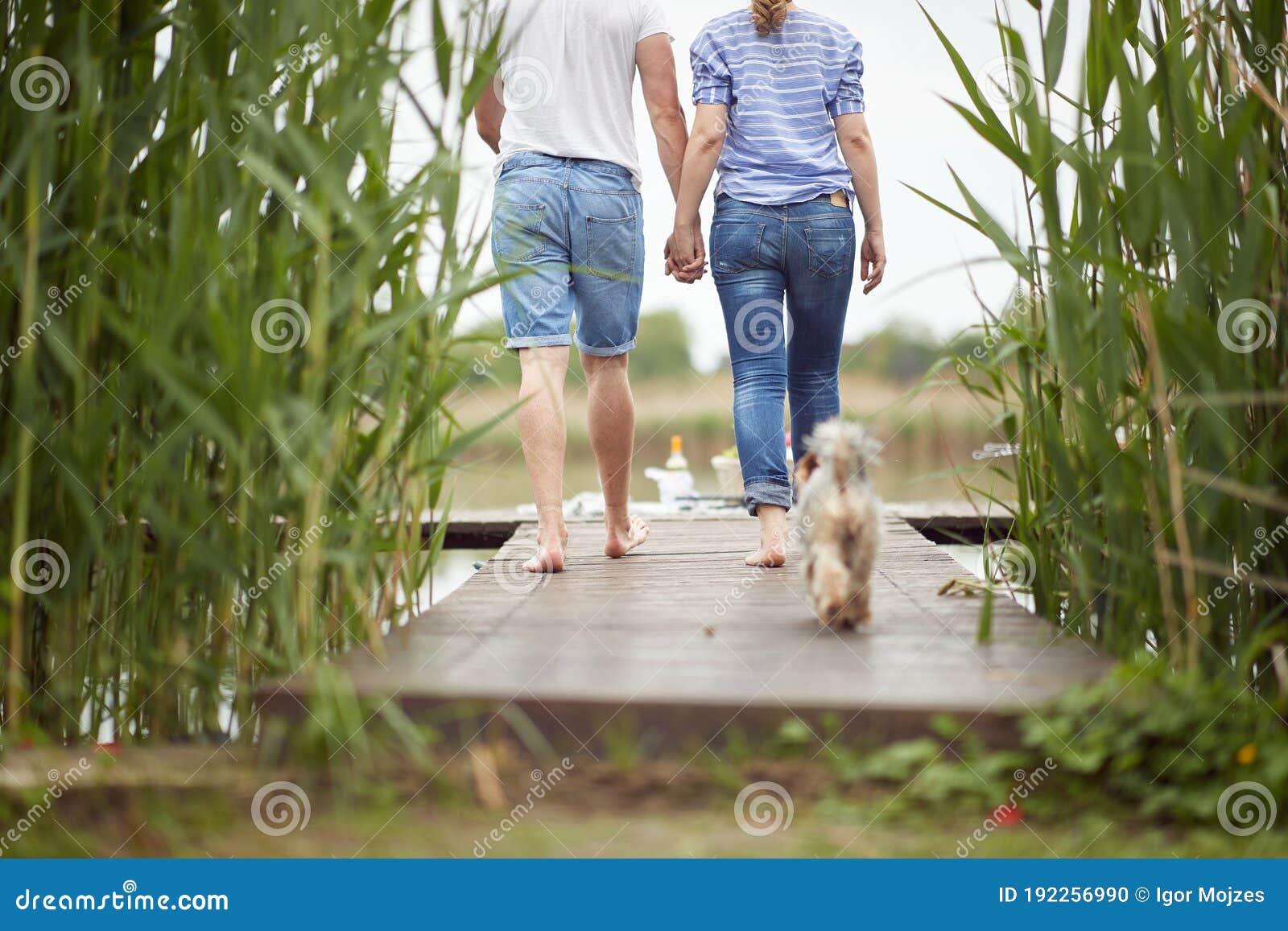 Spouses Enjoy an after Rain Weather on the Dock Stock Photo - Image of ...