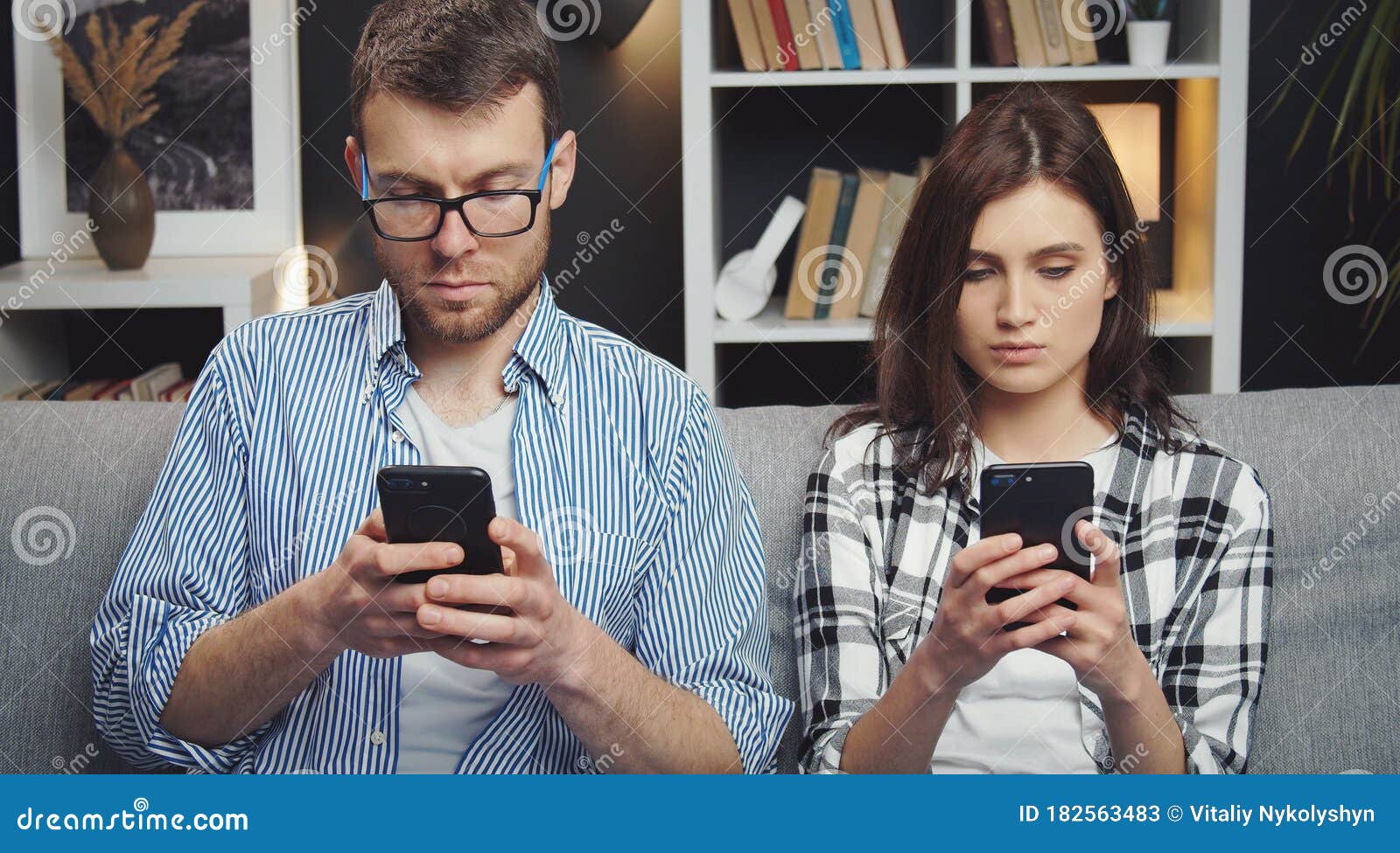 Spouses Using Their Smartphones Stock Image - Image of mobile, people ...