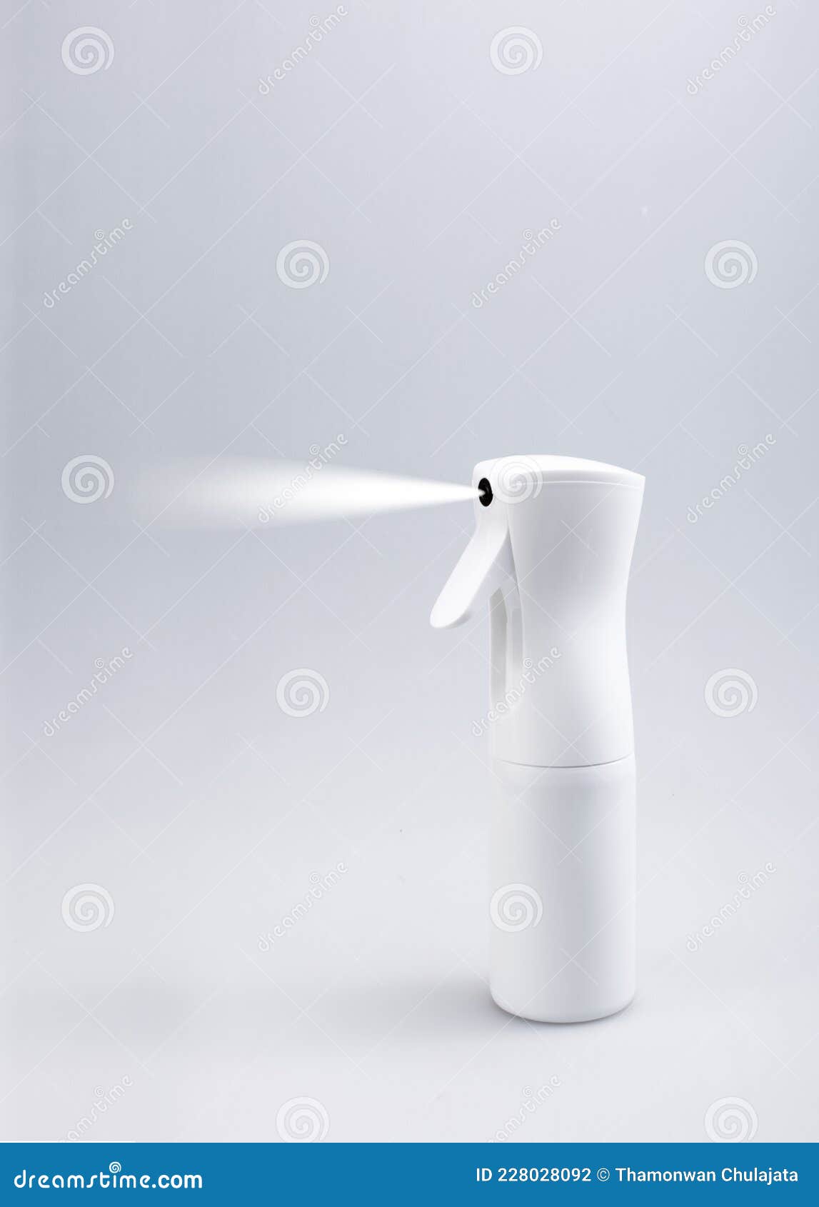 Spray bottle is spritzing stock photo. Image of household - 228028092