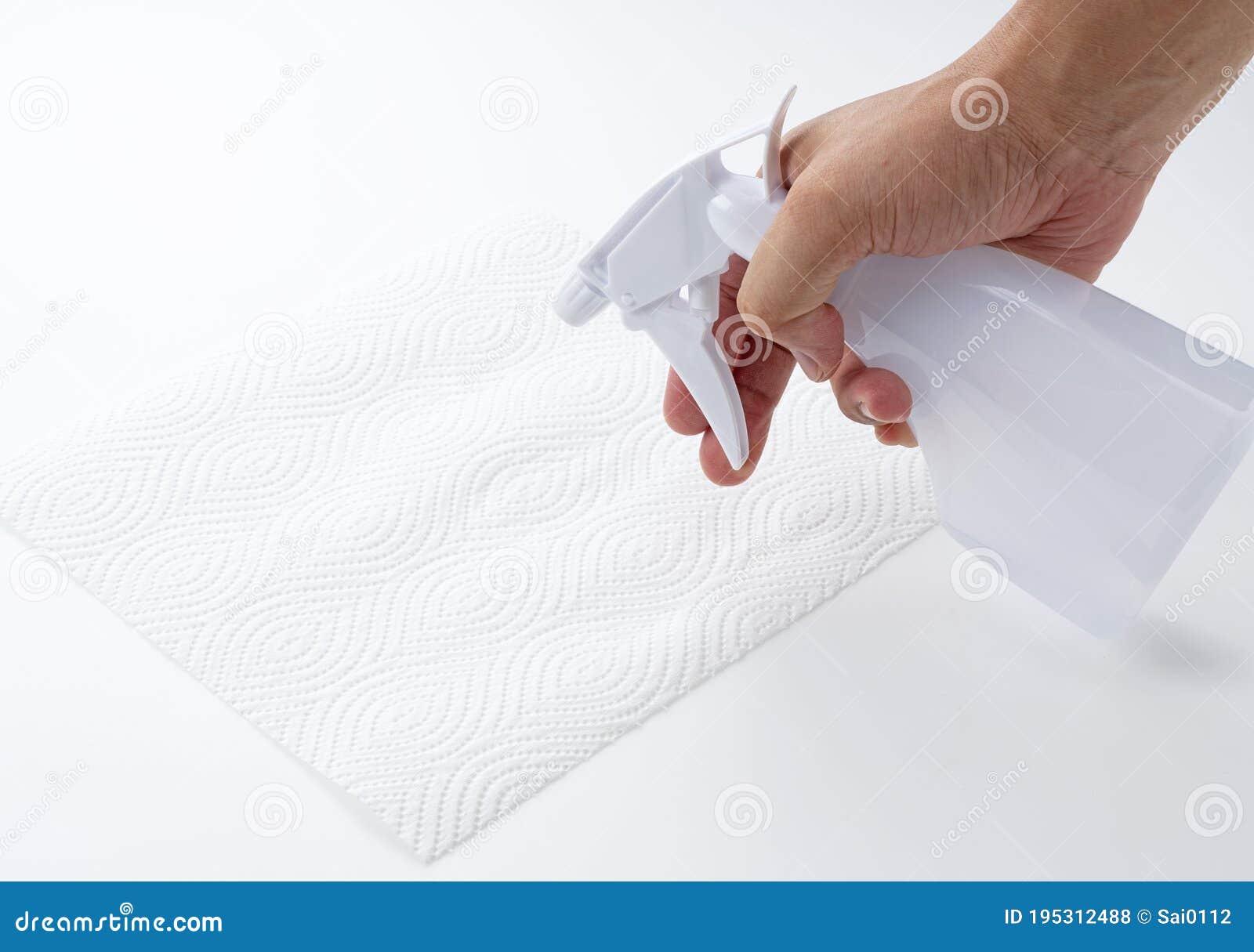 Spray Detergent on Kitchen Paper with a Spray Bottle Stock Photo ...
