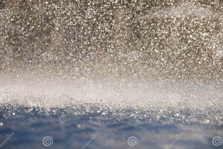 Spray from the Falling Drops on the Water Surface Stock Photo - Image ...