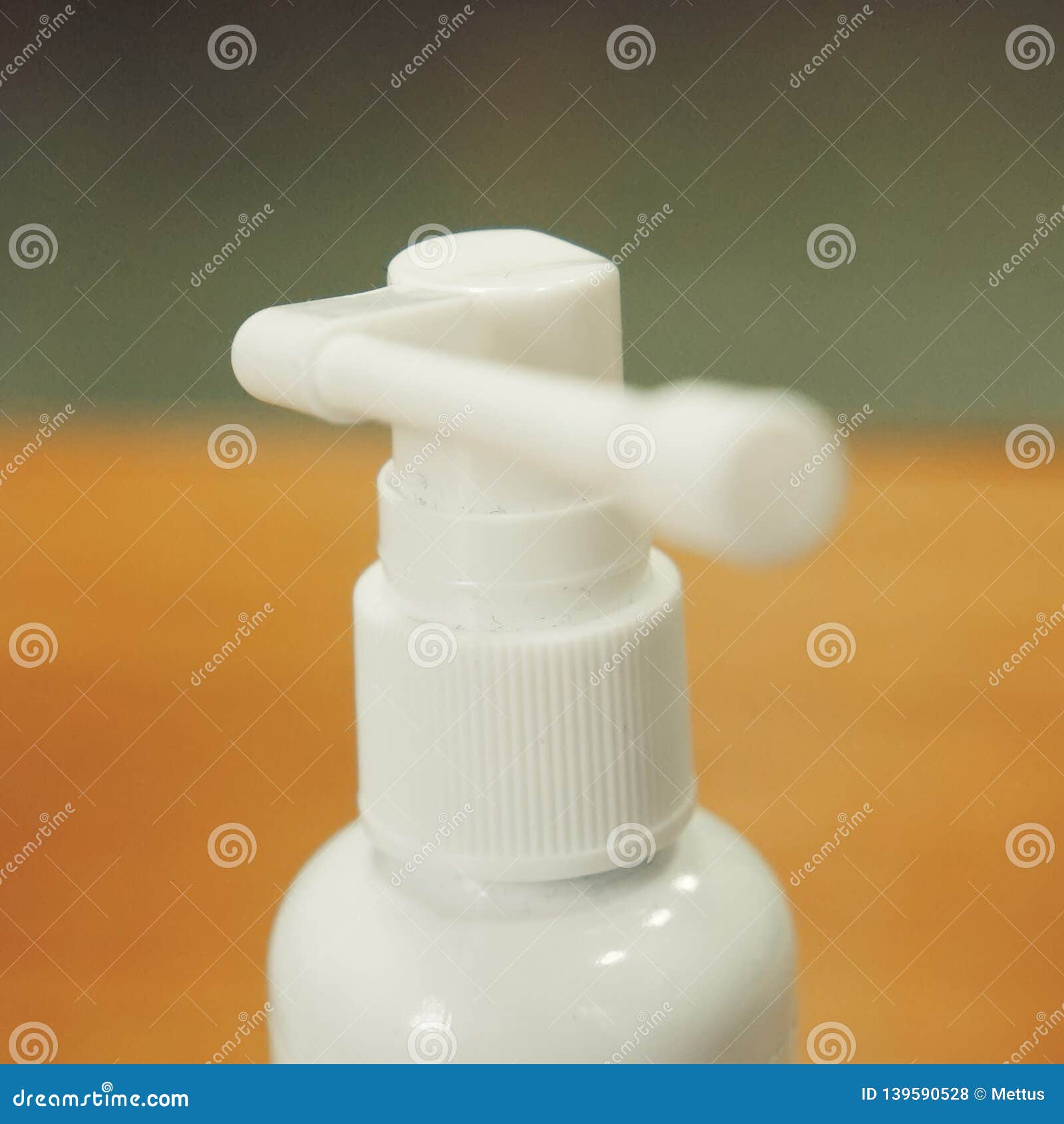 Spray inhaler on table top stock photo. Image of holding - 139590528