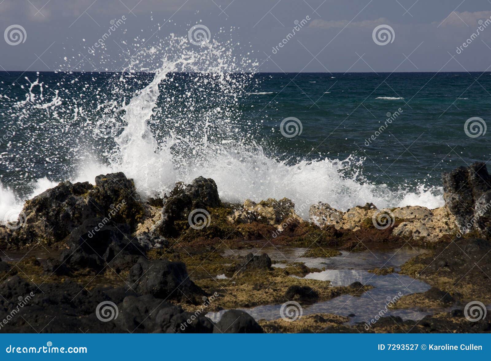 Spray on Lava Rocks stock image. Image of black, splash - 7293527