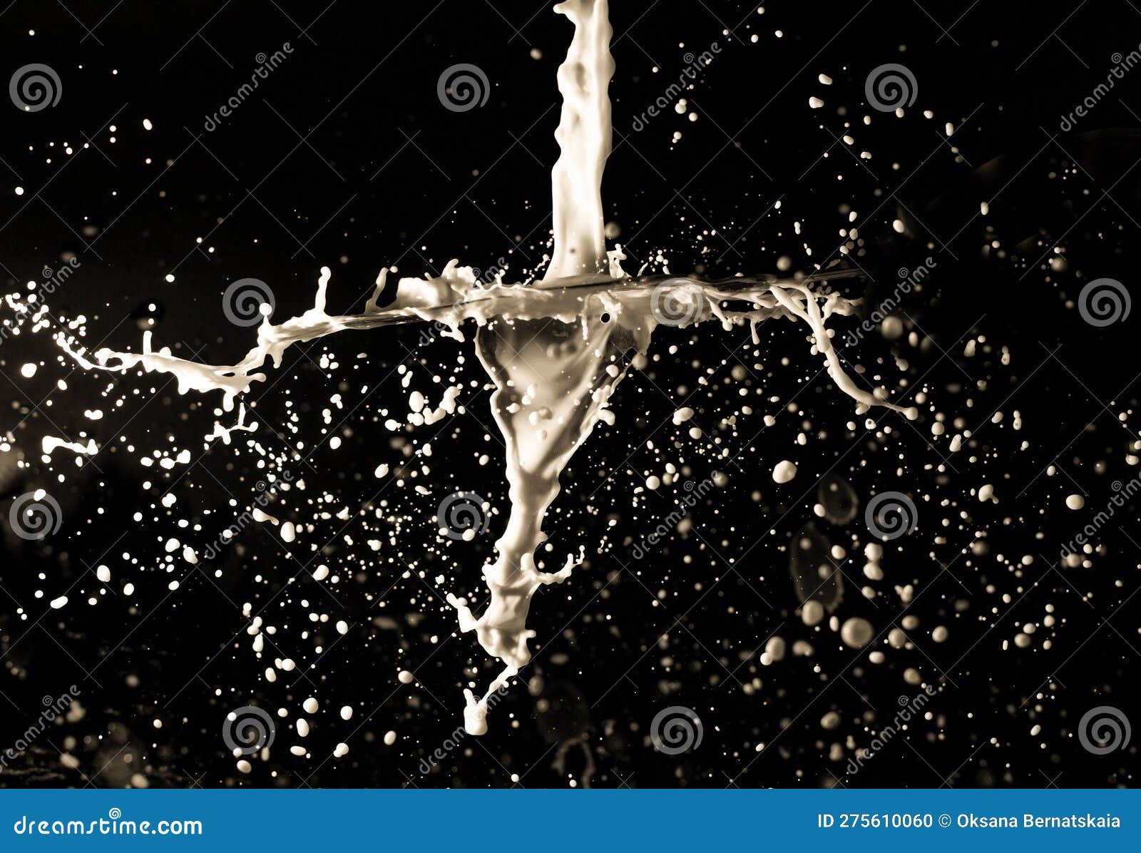 Spray of Milk on Black Background Stock Photo - Image of shallow, blue ...