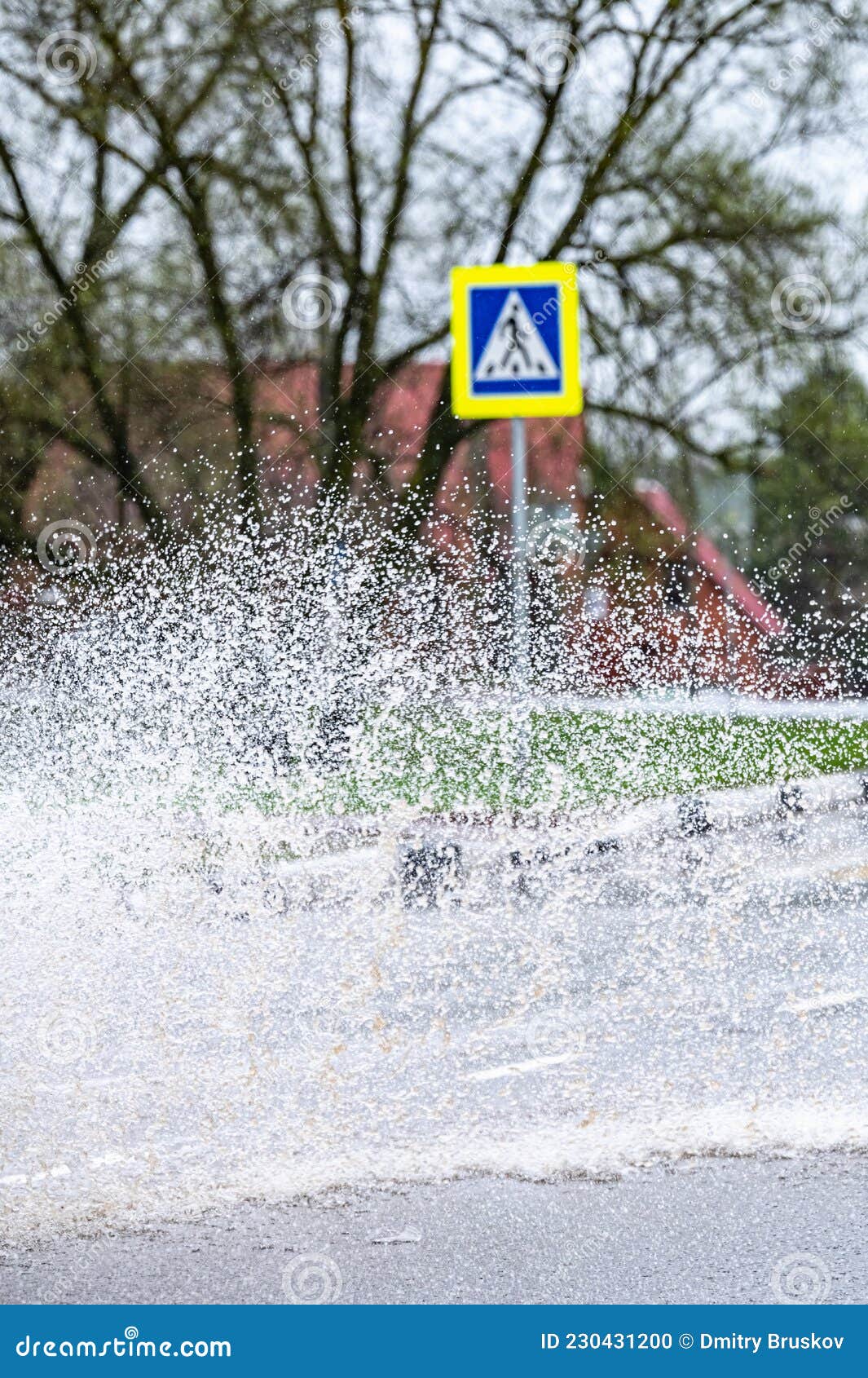 Spray of a Passing Car in a Puddle Stock Photo - Image of disaster ...