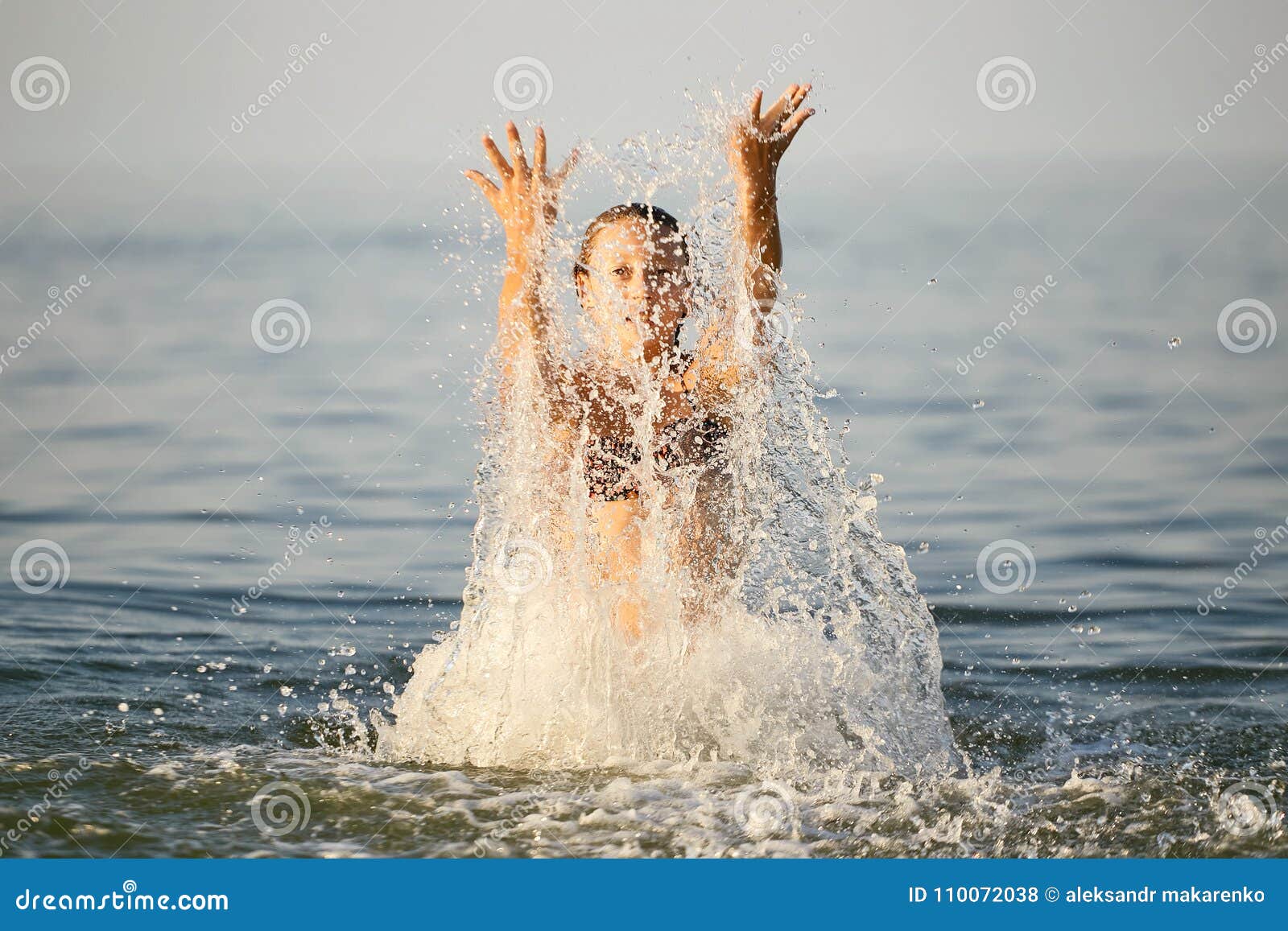 Spray with Water. Girl Having Fun Bathing in the Sea. Stock Photo ...
