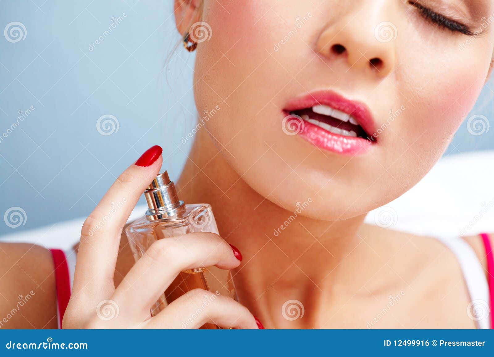 Spraying eau de toilette stock photo. Image of lady, lips - 12499916
