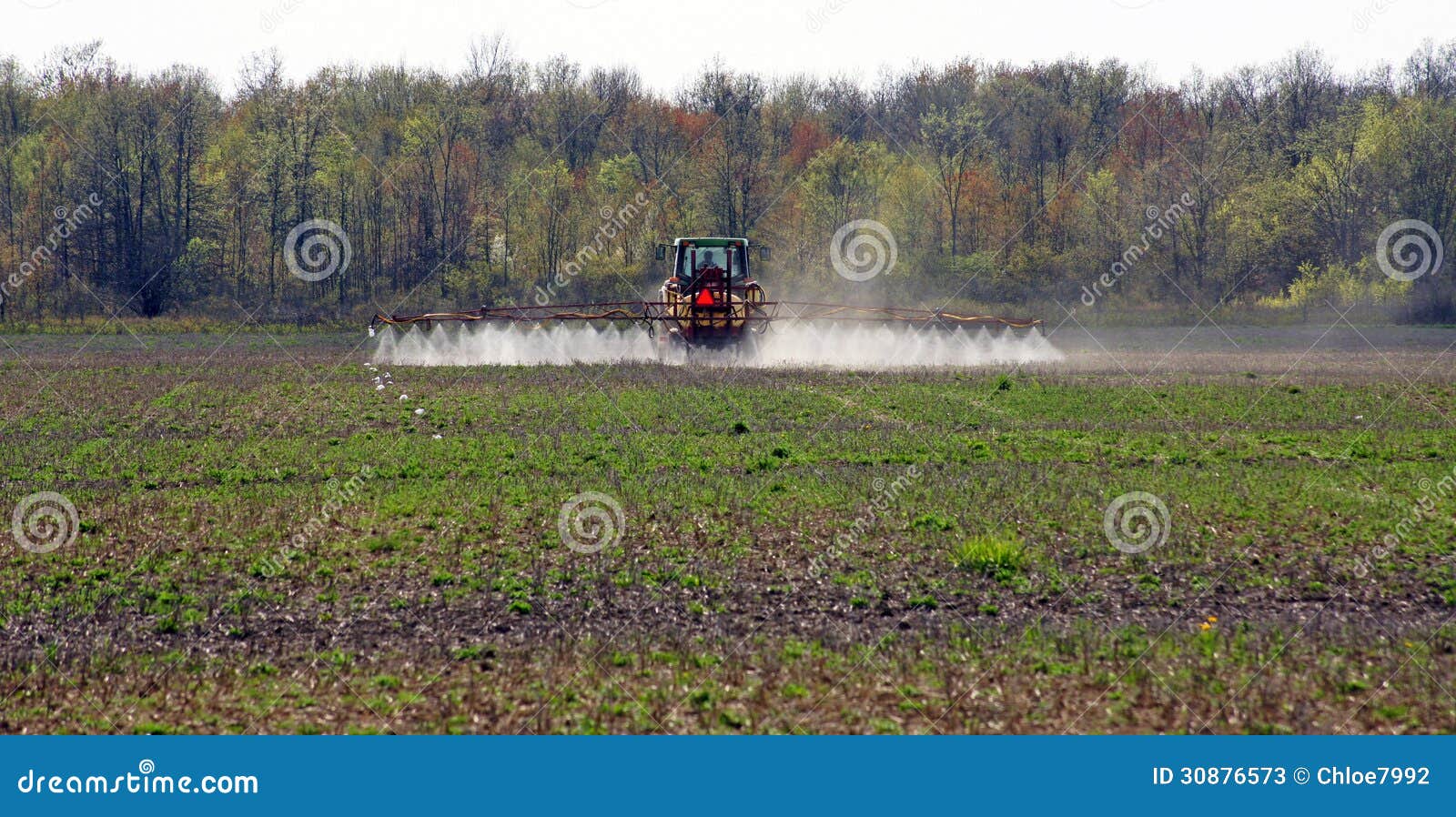 Spraying the fields stock image. Image of equipment, spray - 30876573