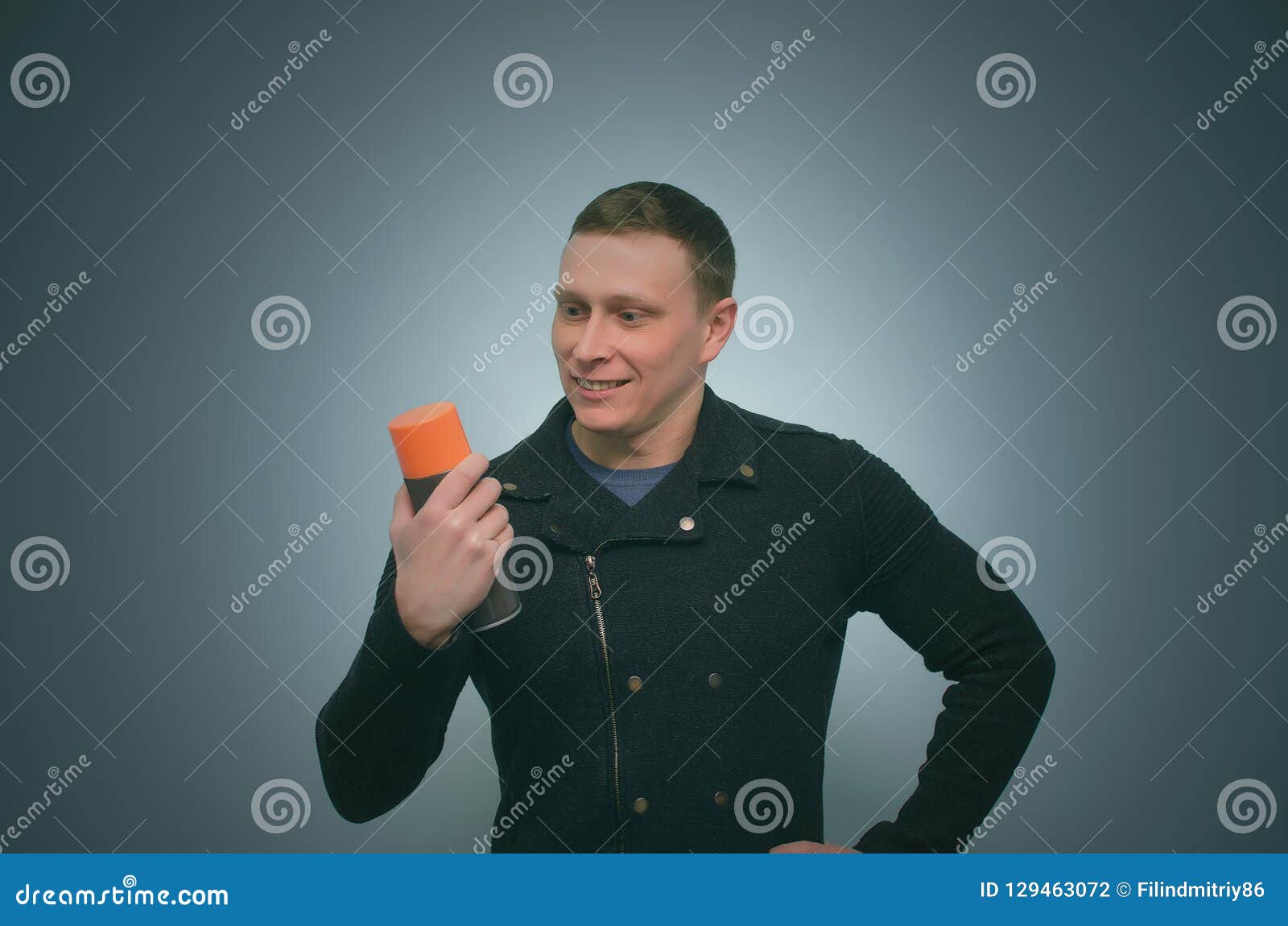 Spraying paint. stock photo. Image of cheerful, background - 129463072