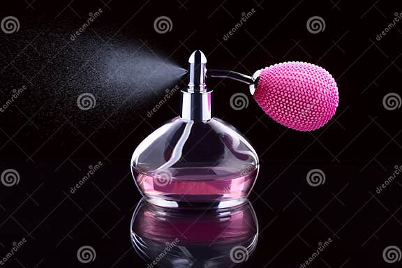 Spraying perfume stock photo. Image of hygiene, drop - 27443666