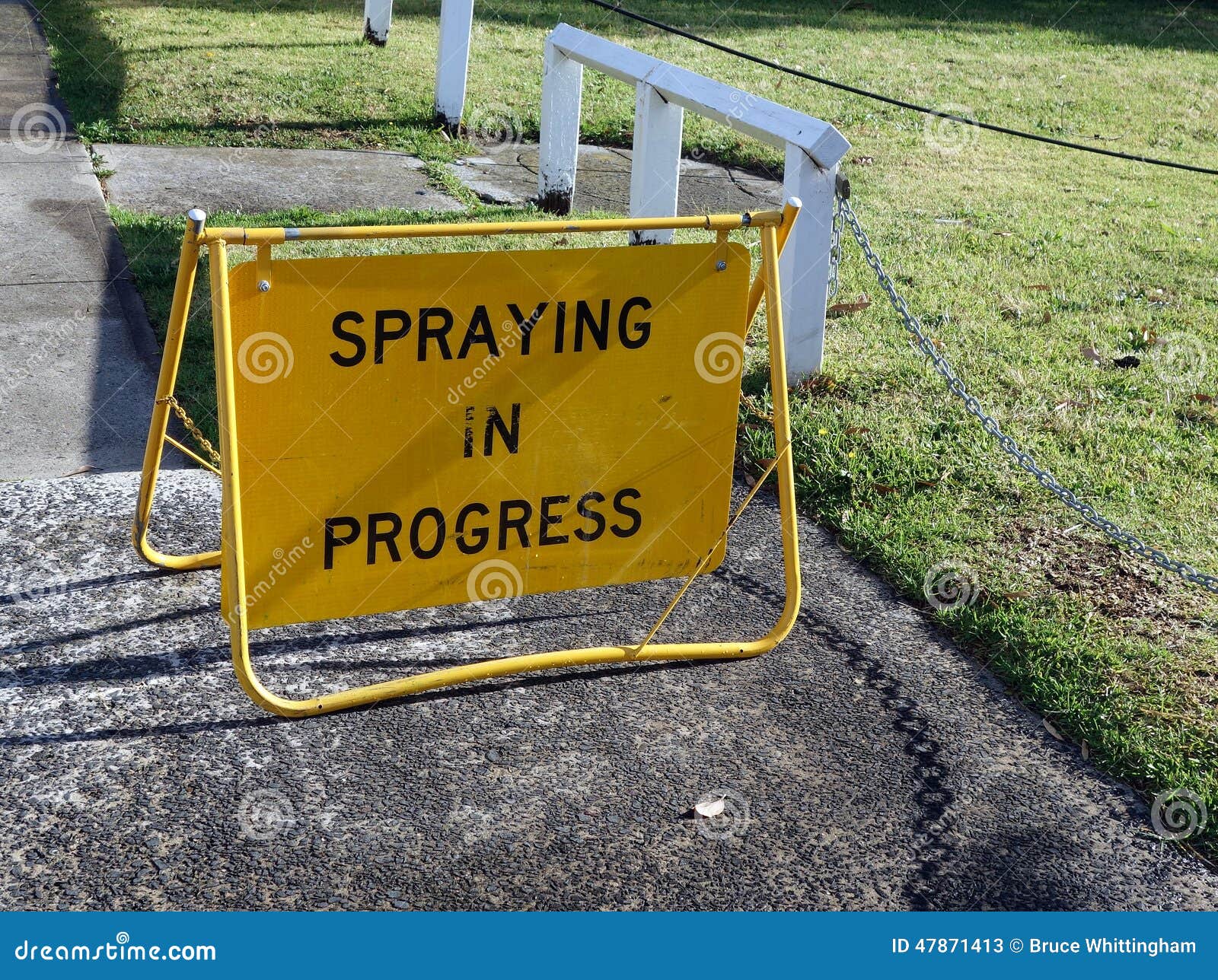Spraying in Progress Sign stock image. Image of spraying - 47871413