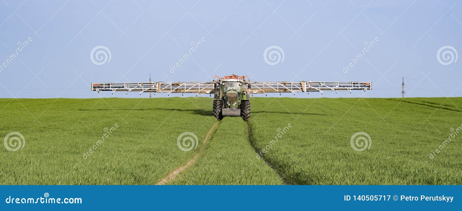 Spraying wheat field stock image. Image of pesticides - 140505717