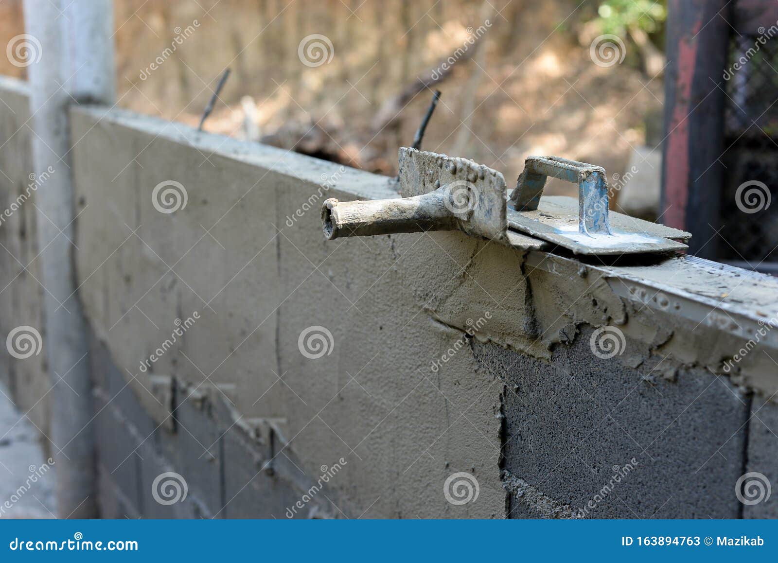 Spread cement on bricks stock image. Image of foundation - 163894763