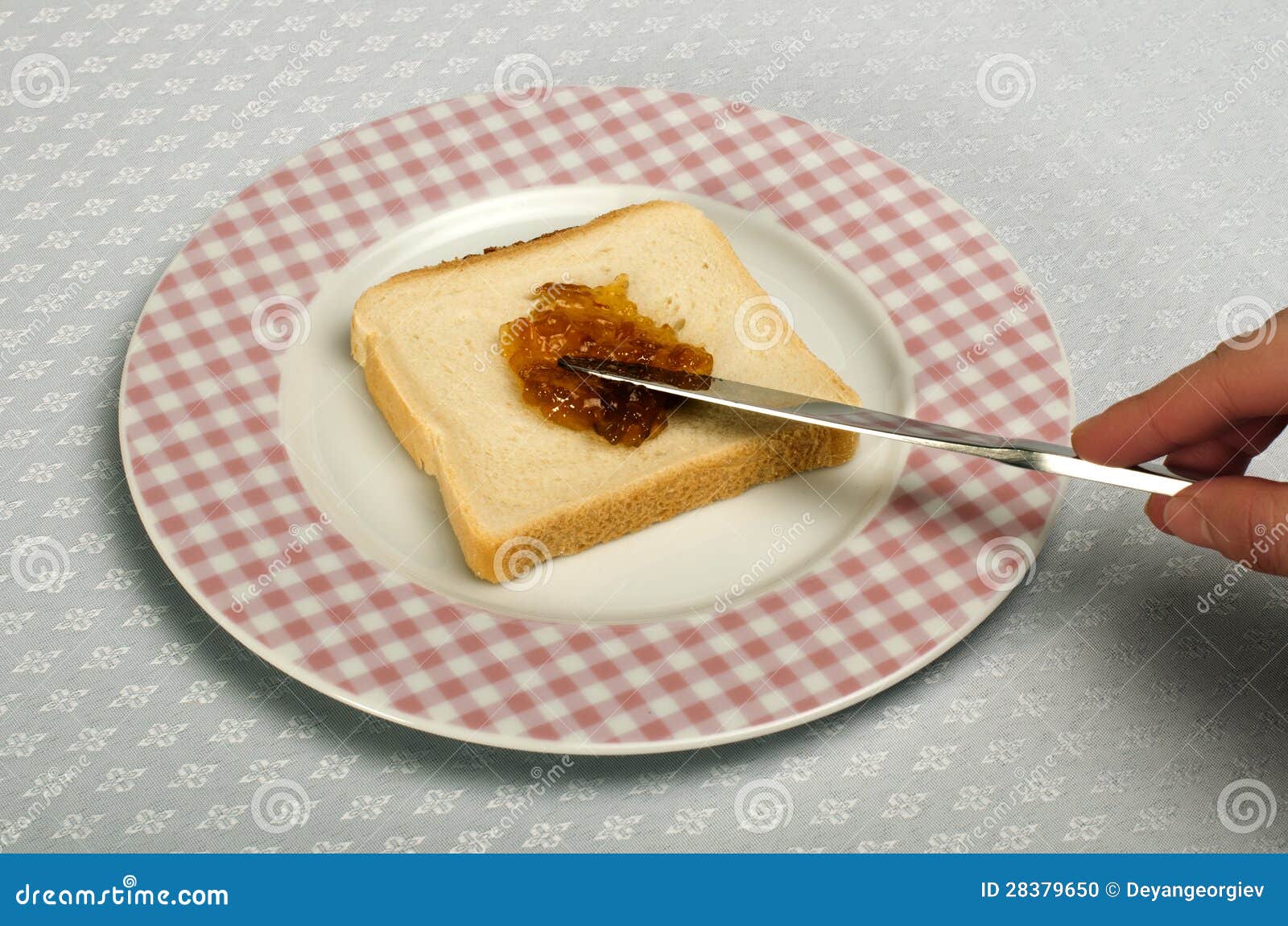 Spread jam on bread stock photo. Image of breakfast, hand - 28379650