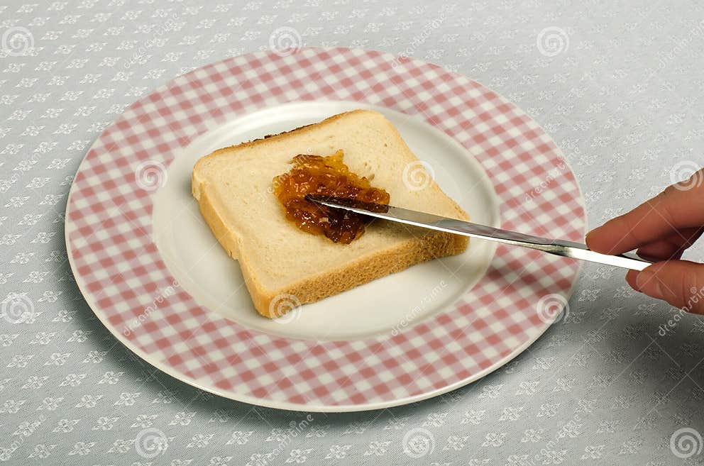Spread jam on bread stock photo. Image of breakfast, hand - 28379650