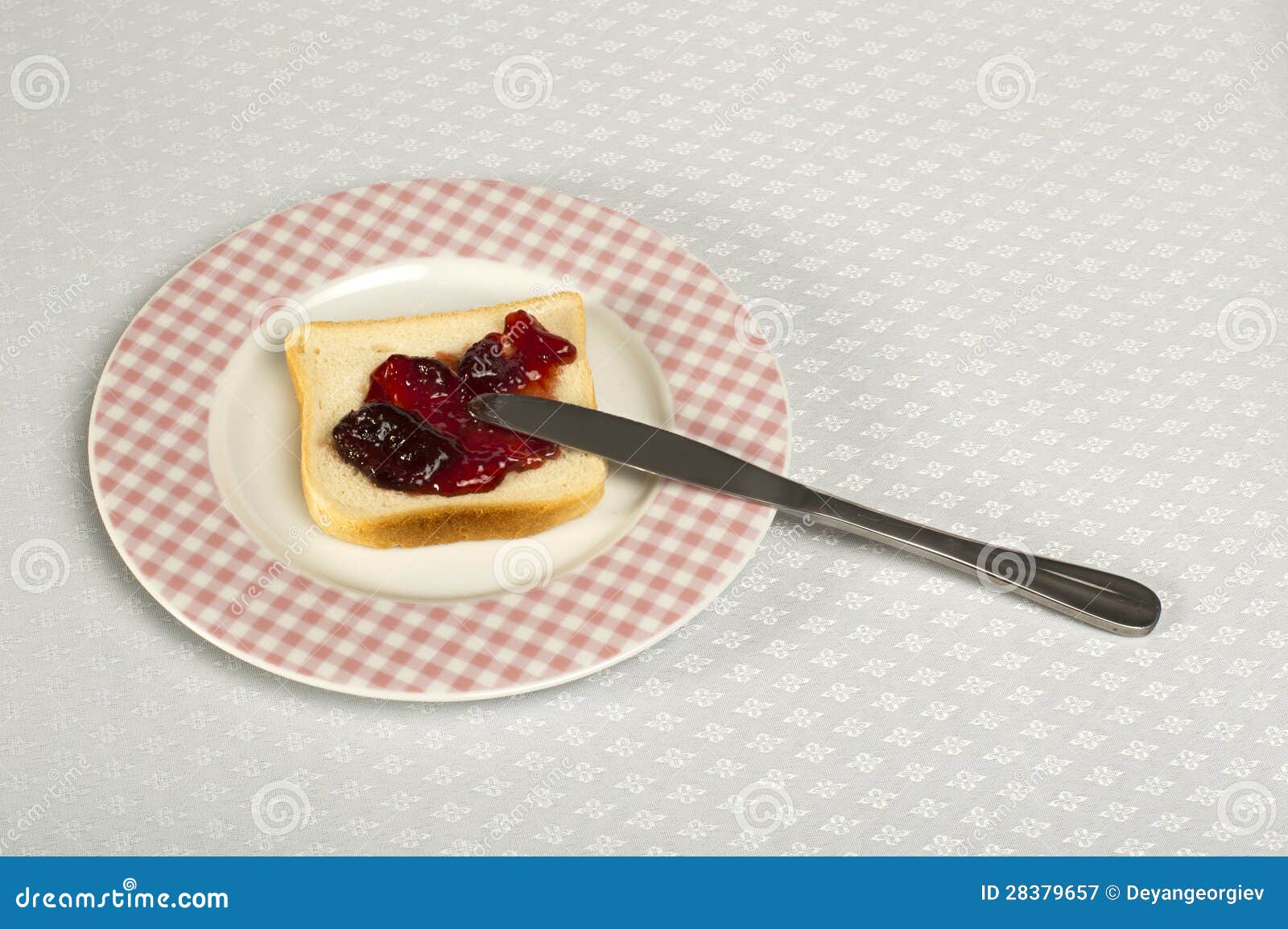 Spread jam on bread stock image. Image of dessert, raspberry - 28379657