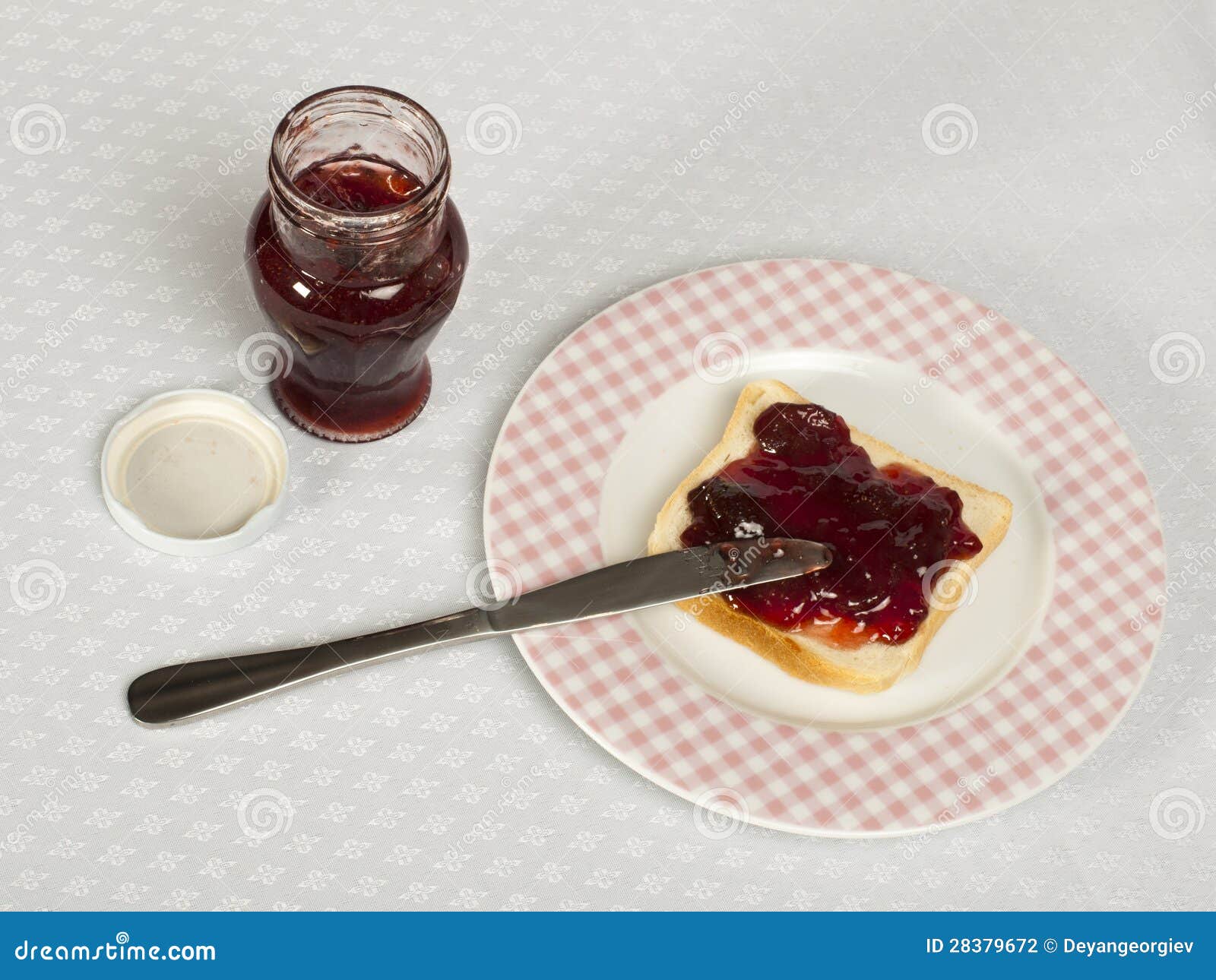 Spread jam on bread stock photo. Image of canned, gourmet - 28379672