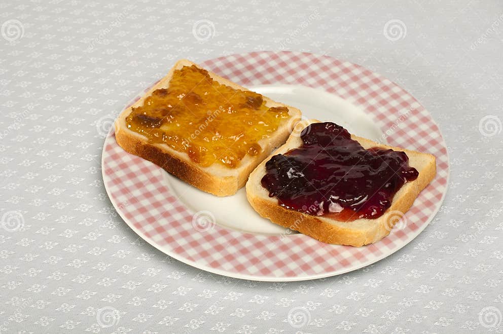 Spread jam on bread stock image. Image of marmalade, bowl - 28379677