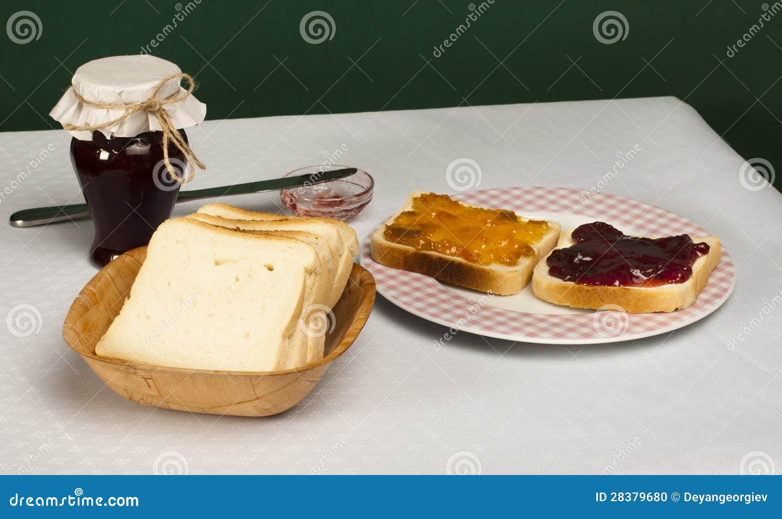 Spread jam on bread stock photo. Image of knife, breakfast - 28379680