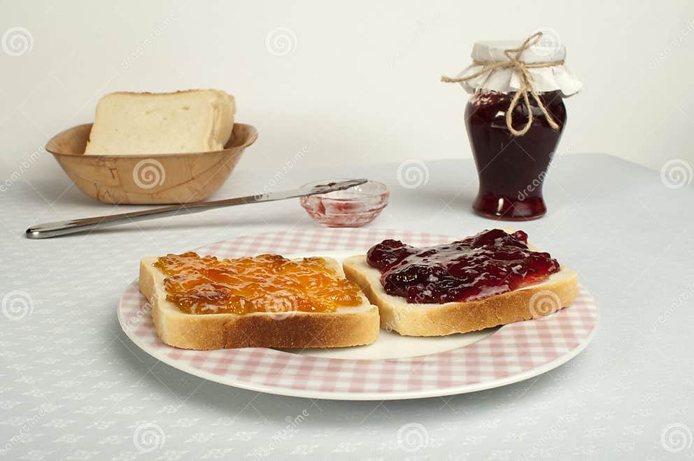 Spread jam on bread stock image. Image of gourmet, knife - 28379681