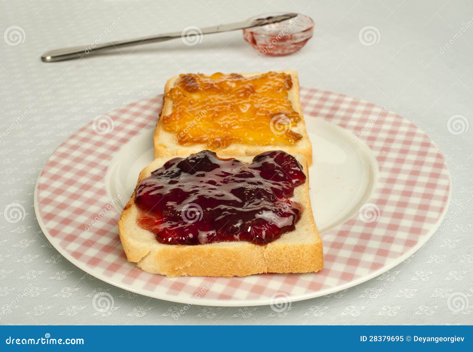 Spread jam on bread stock image. Image of dessert, food - 28379695