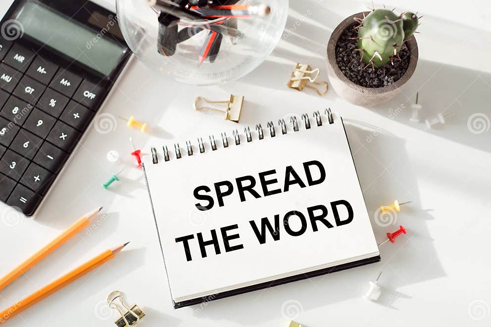Spread the Word on a Notepad with Office Supplies Stock Image - Image ...