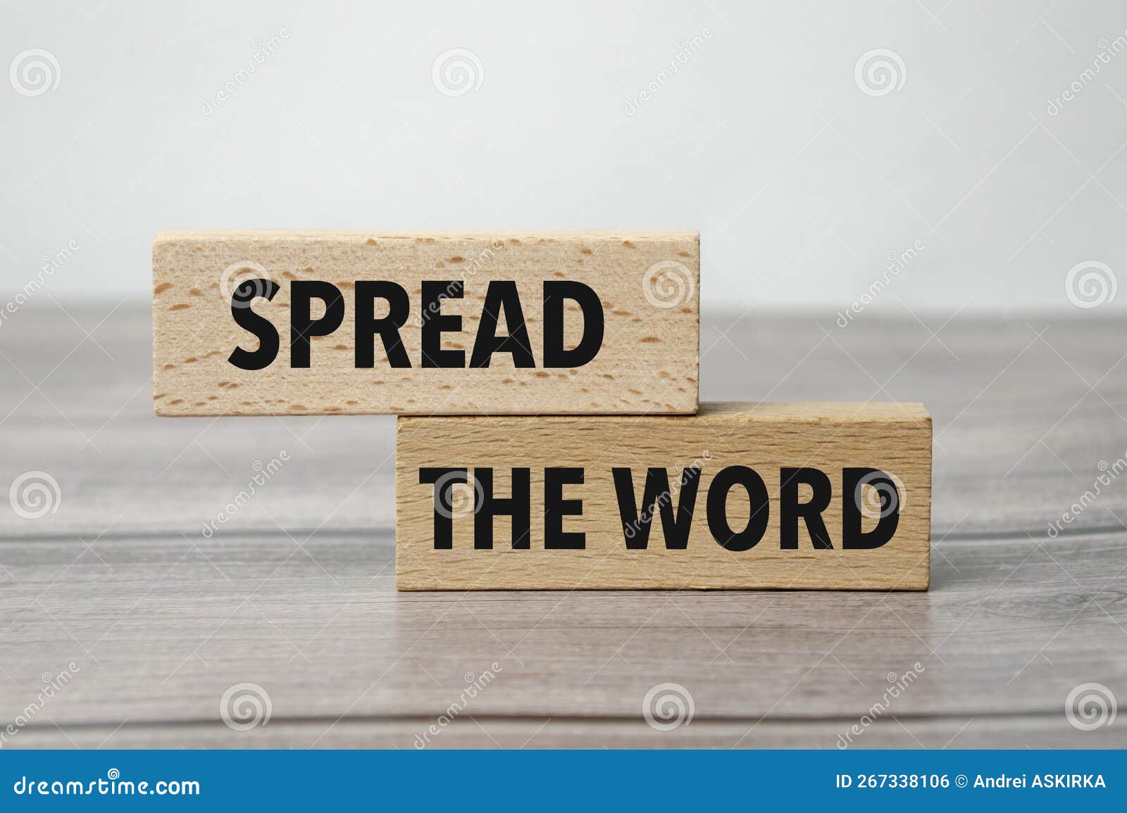 SPREAD the WORD Text on Wooden Block and Light Background Stock Photo ...