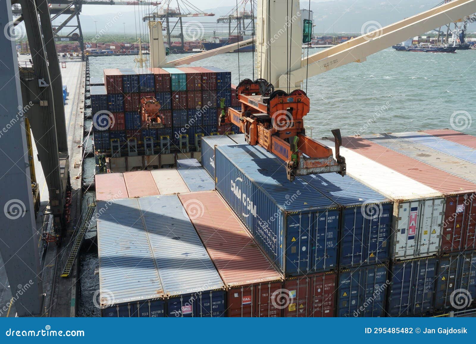 Spreader of Gantry Crane Operated by Stevedores Approaching Container ...