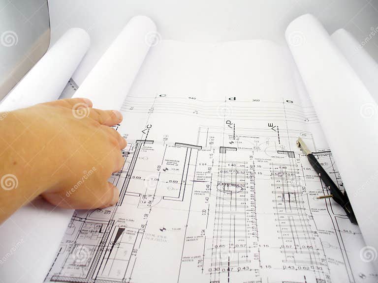 Spreading blueprints stock photo. Image of design, construct - 1064252