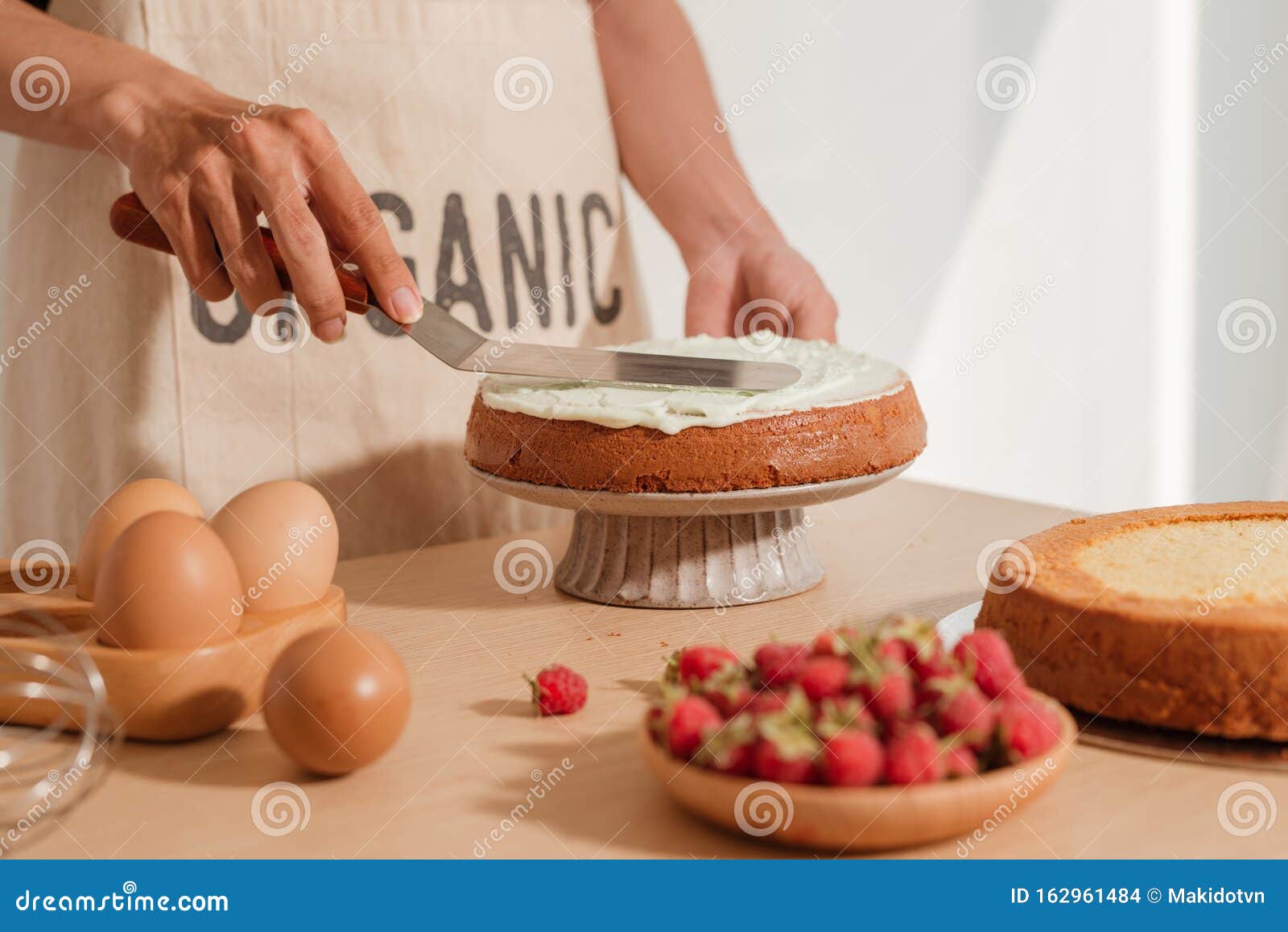 Spreading Cream on Sponge Cake. Making Red Velvet Process Stock Photo ...