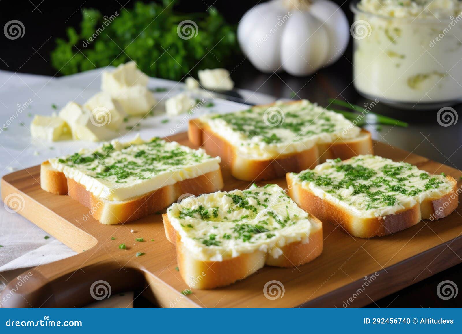 Spreading Garlic Paste on Toasted Bread Slices Stock Photo - Image of ...