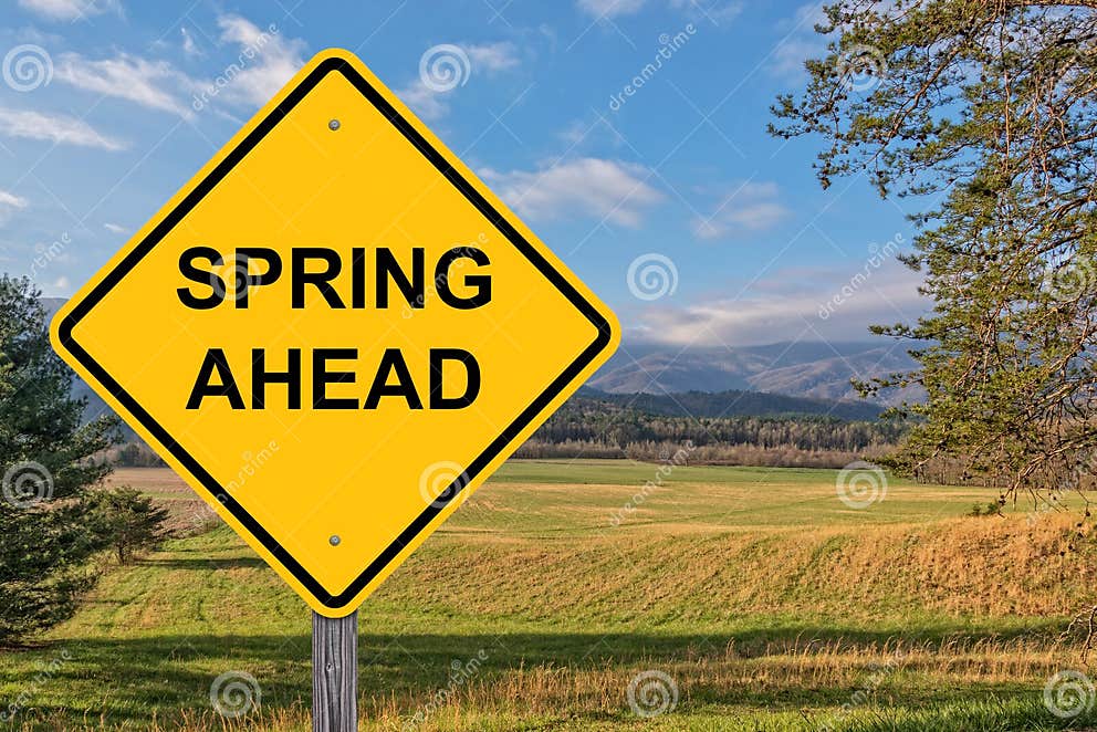 Spring Ahead Caution Sign stock photo. Image of concept - 133408618