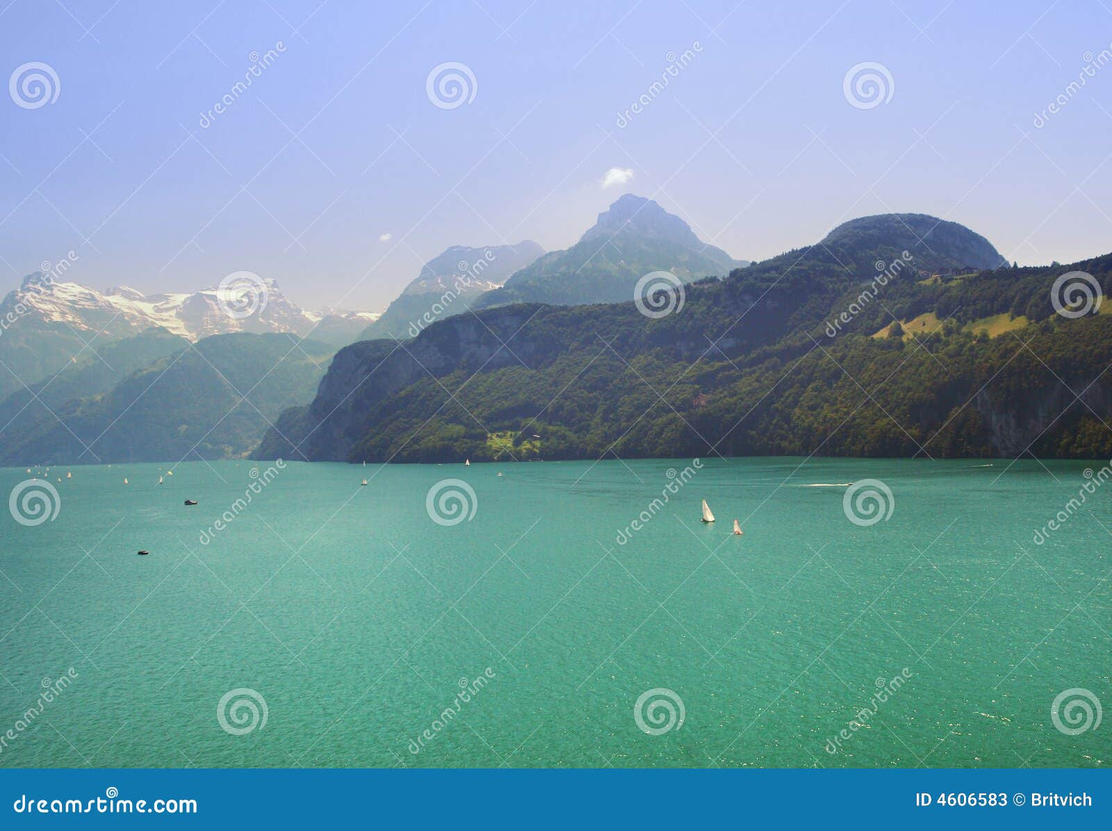 Spring Alpine Lake stock image. Image of peaks, swiss - 4606583