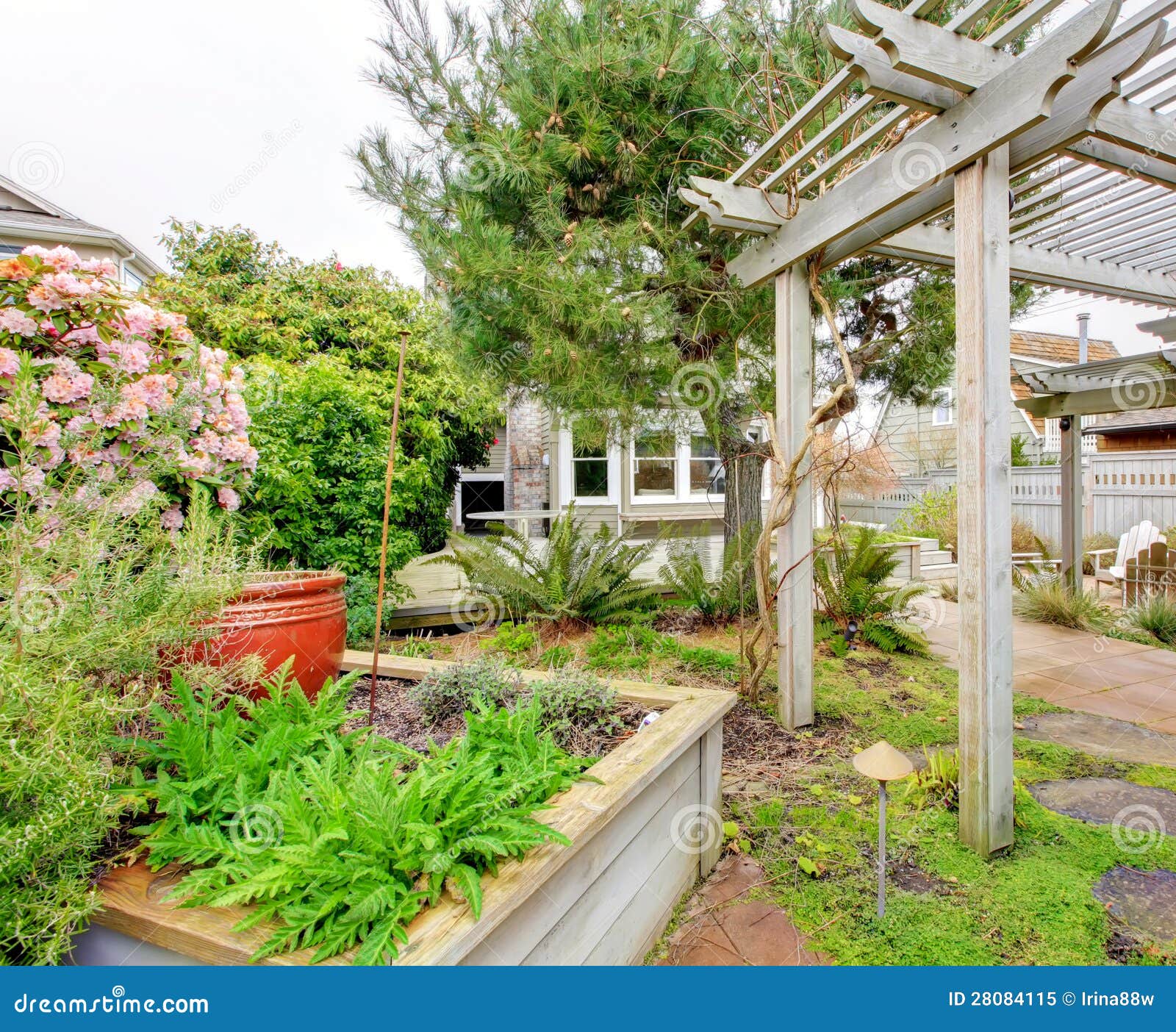 Spring Backyard with Garden Beds Stock Image - Image of beds, chairs ...